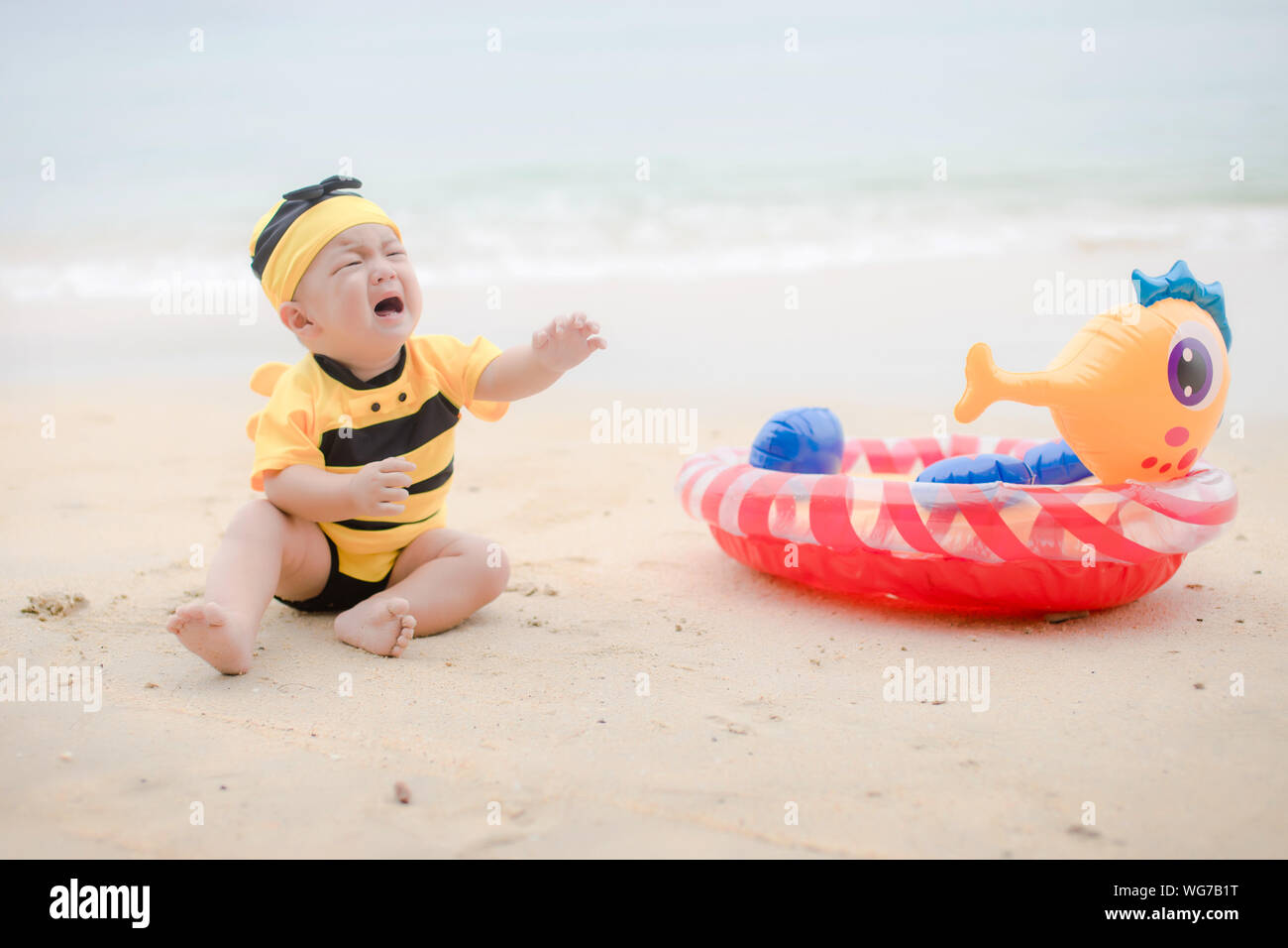 Baby Crying Beach High Resolution Stock Photography and Images - Alamy