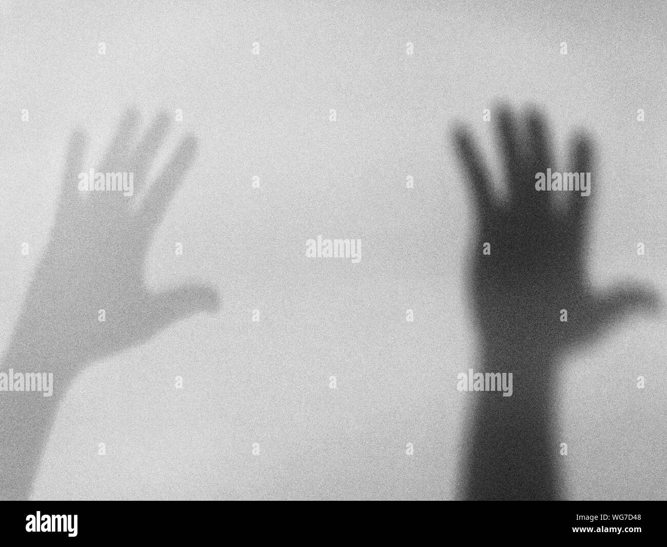Hands on wall hi-res stock photography and images - Alamy