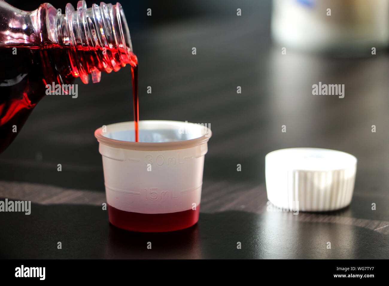 Pouring syrup container hi-res stock photography and images - Alamy