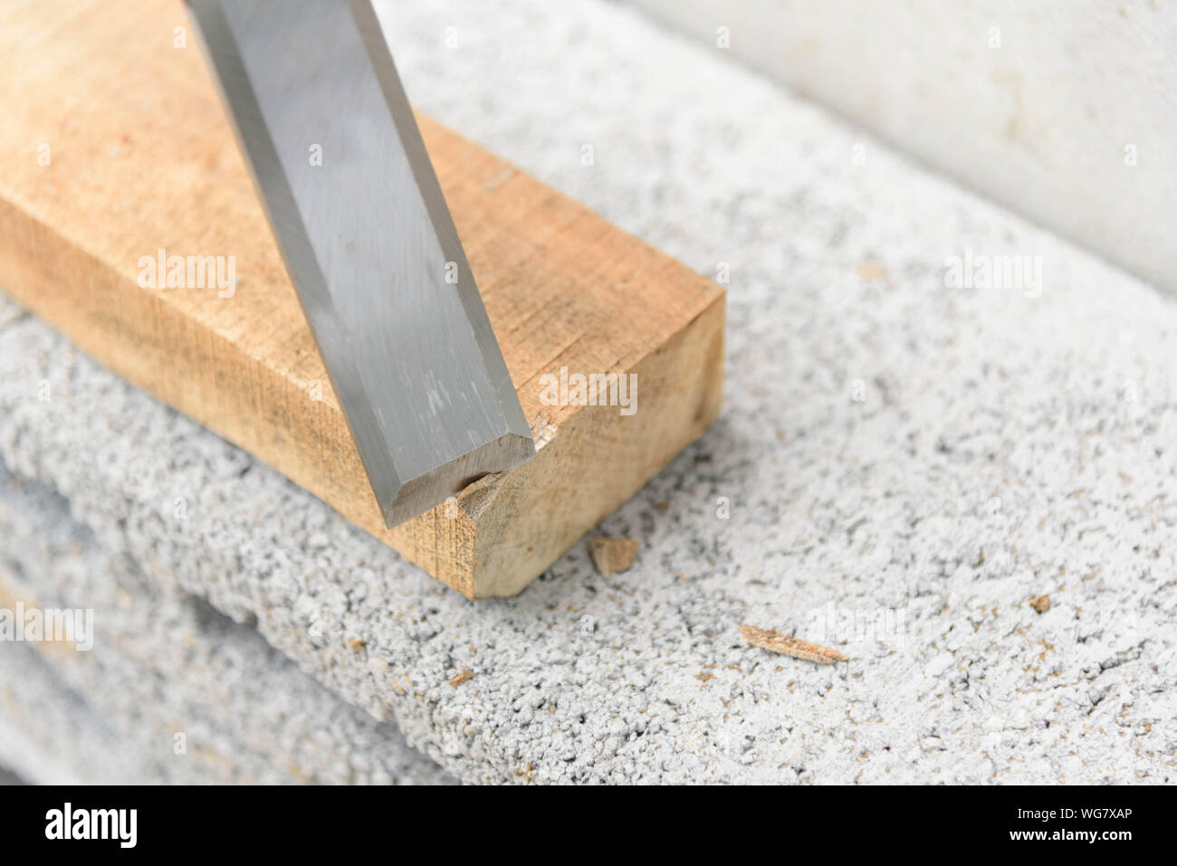 Use chisel latch the wood plate Stock Photo - Alamy