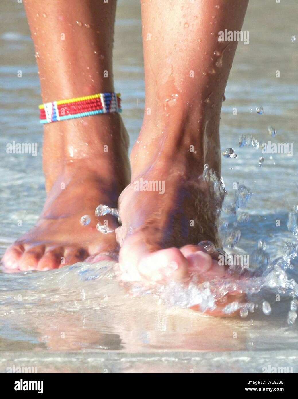 Wading on the beach hi-res stock photography and images - Alamy