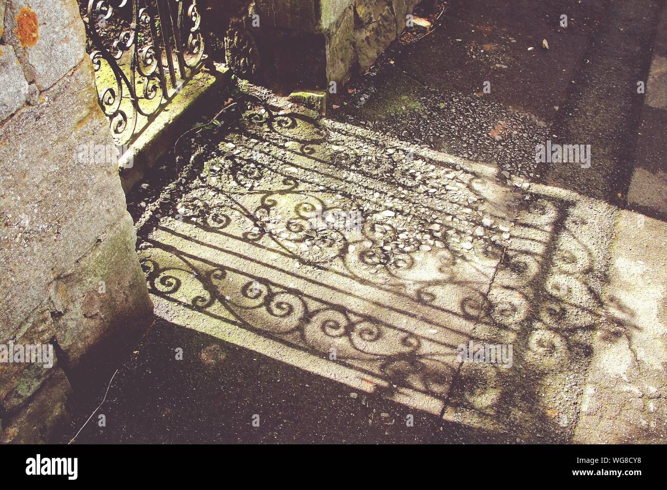 Shadow of gate hi-res stock photography and images - Alamy