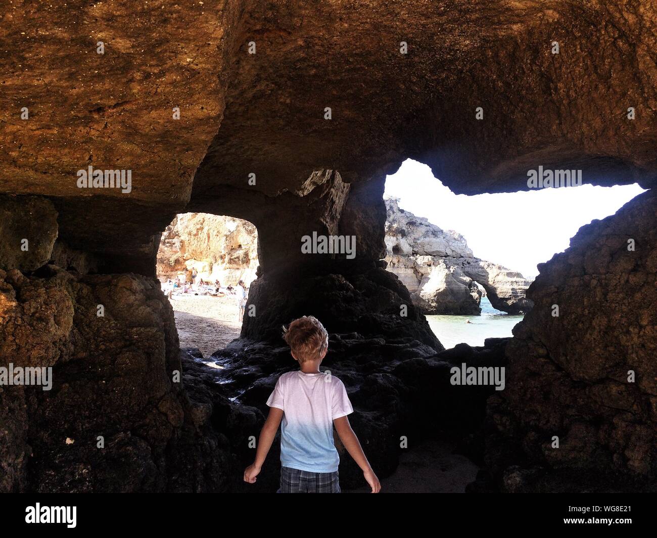 Boy in cave hi-res stock photography and images - Alamy