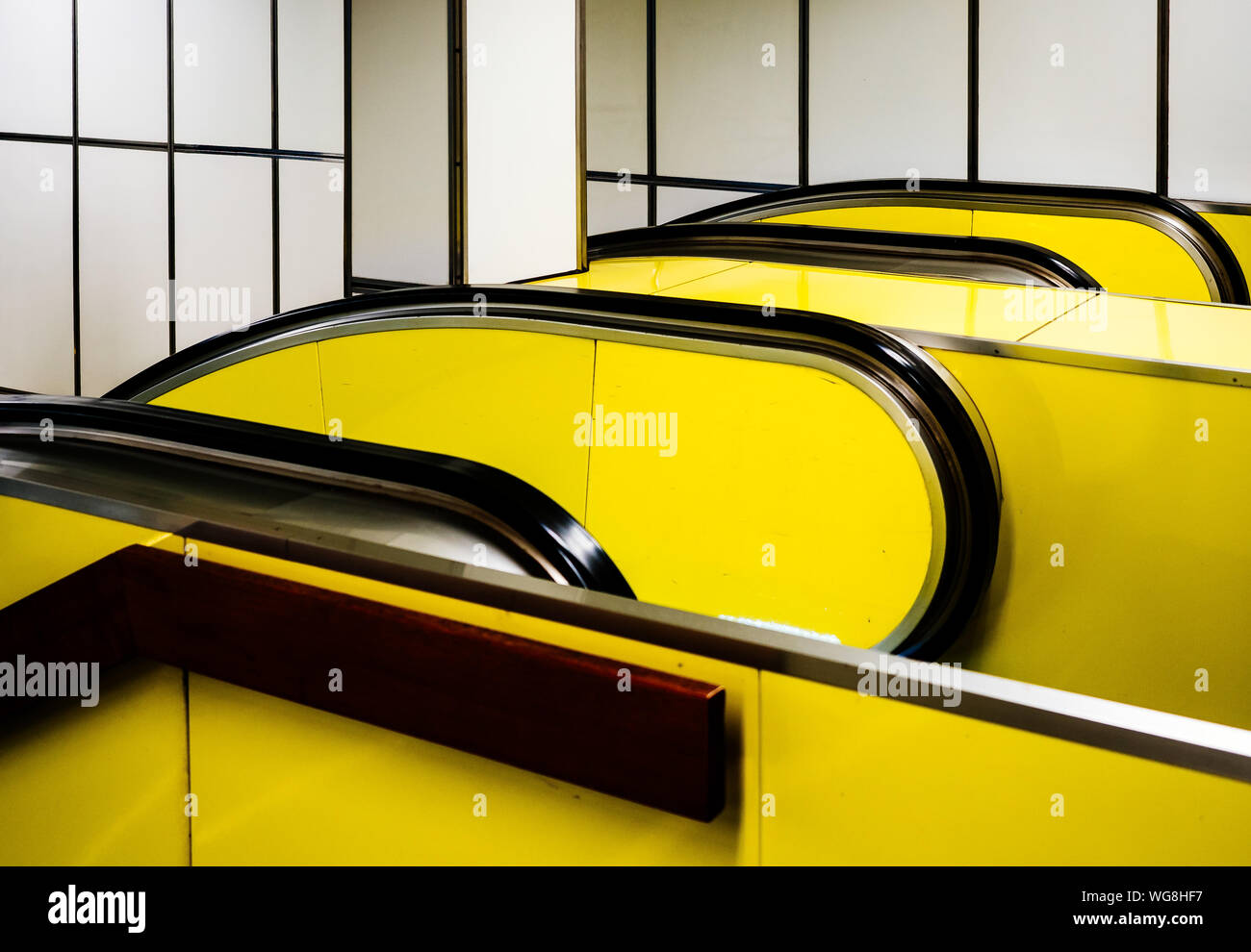 Yellow Escalator In Building Stock Photo - Alamy
