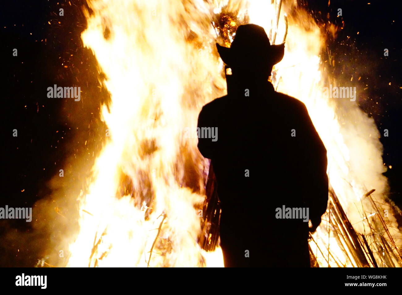 Silhouette man front fire hi-res stock photography and images - Alamy