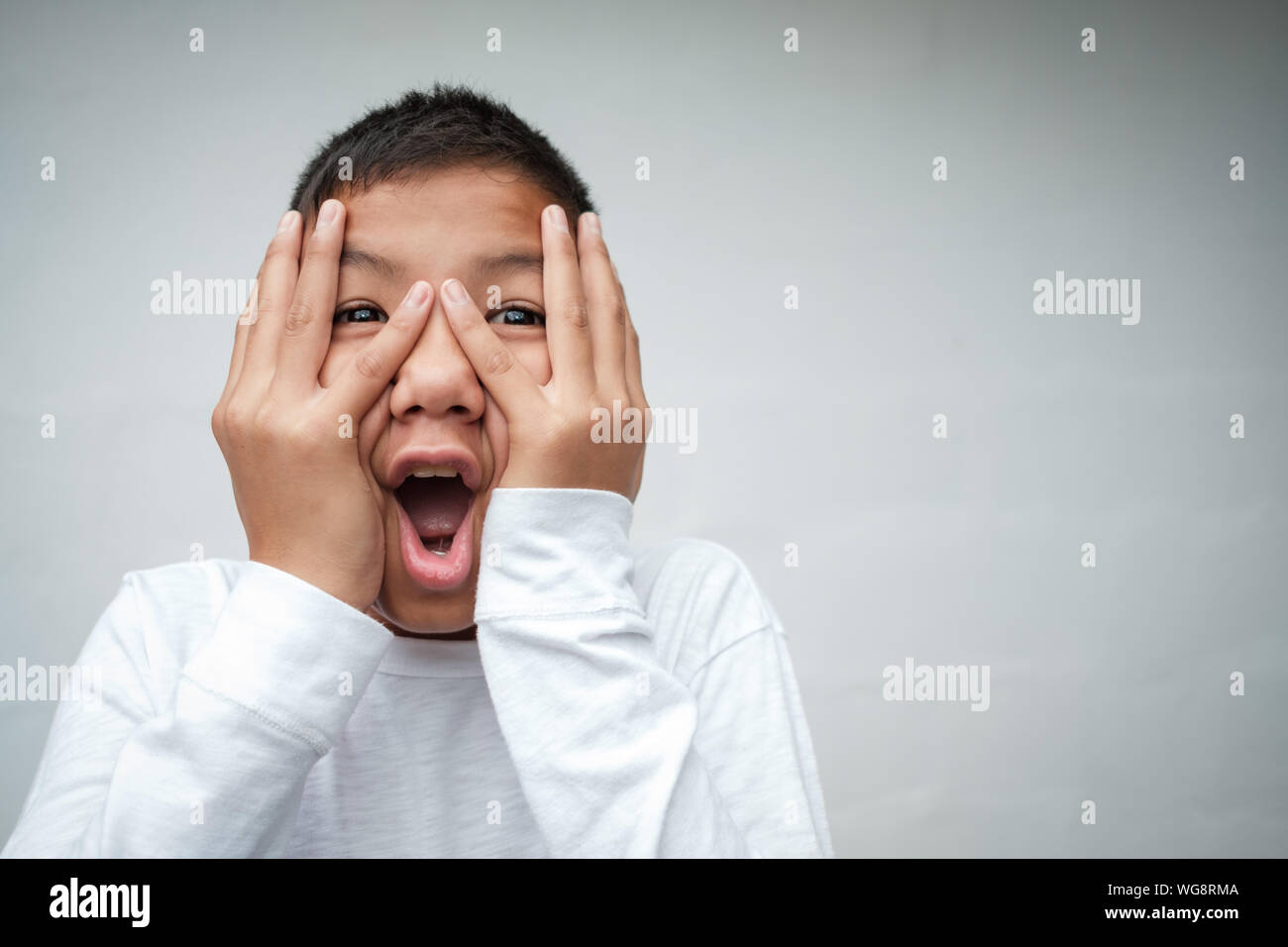 Boy teenager making face hi-res stock photography and images - Alamy