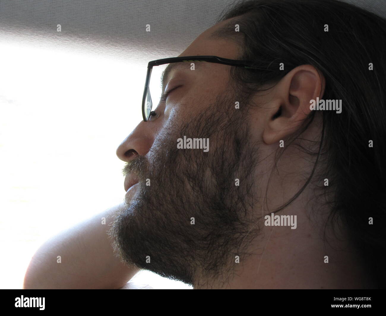 Bearded sleeping man hi-res stock photography and images - Alamy