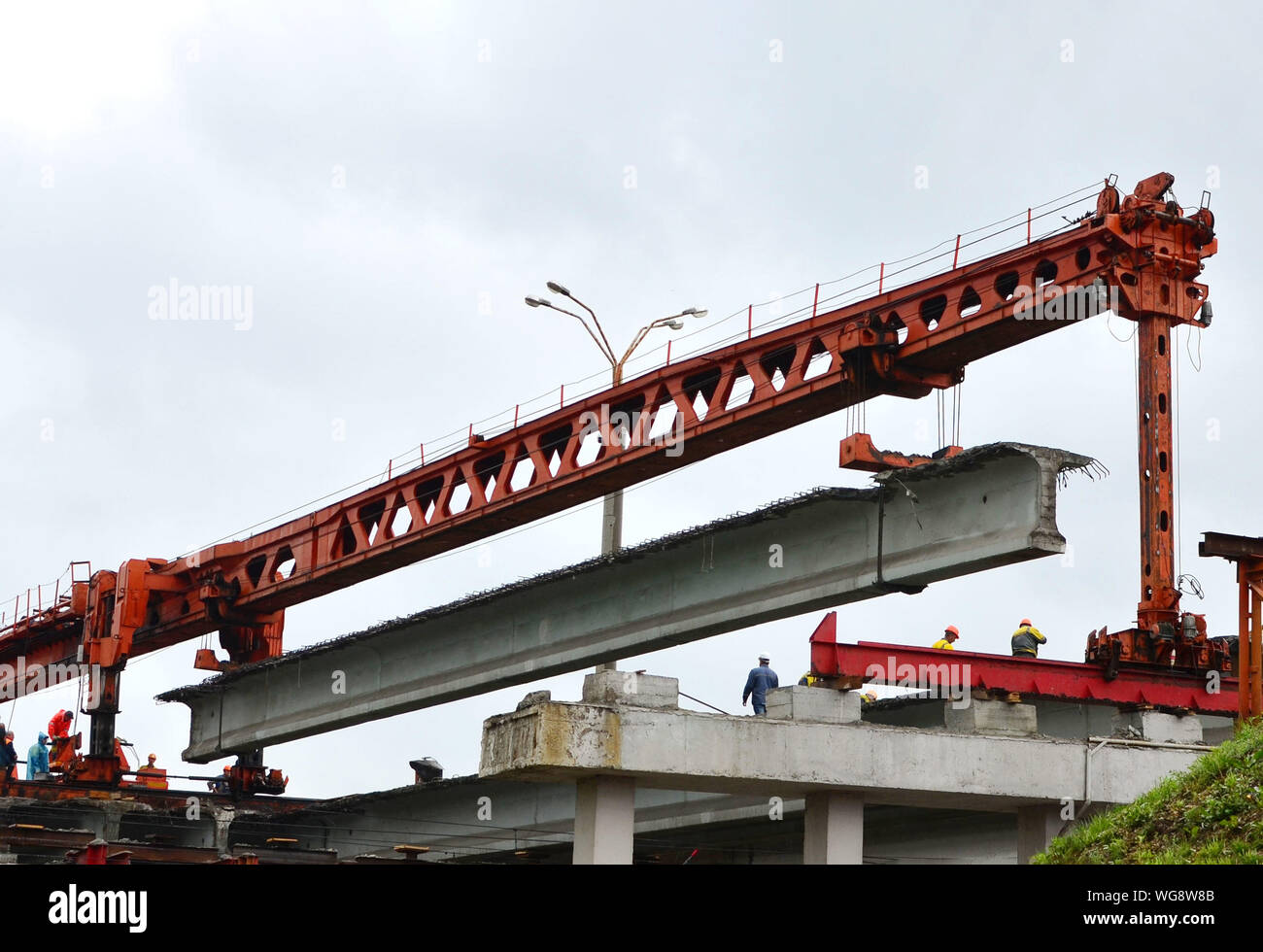 Repair of the automobile bridge over the railway. Mounting crane ...