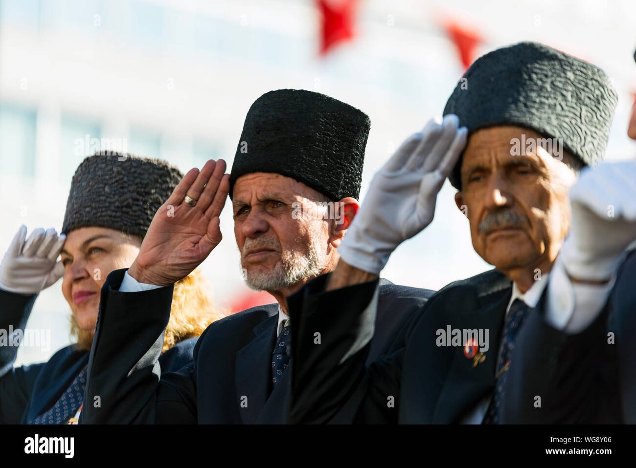 Izmir, Turkey - October 29, 2019: Three veterans salute in a frame at ...