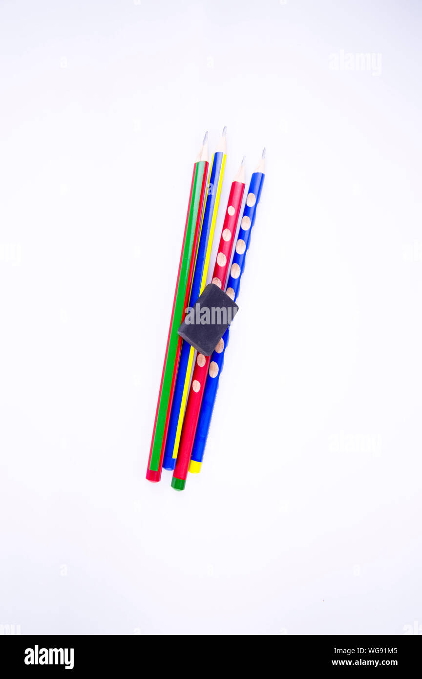 colored pencils with eraser to erase on a white background, there is ...