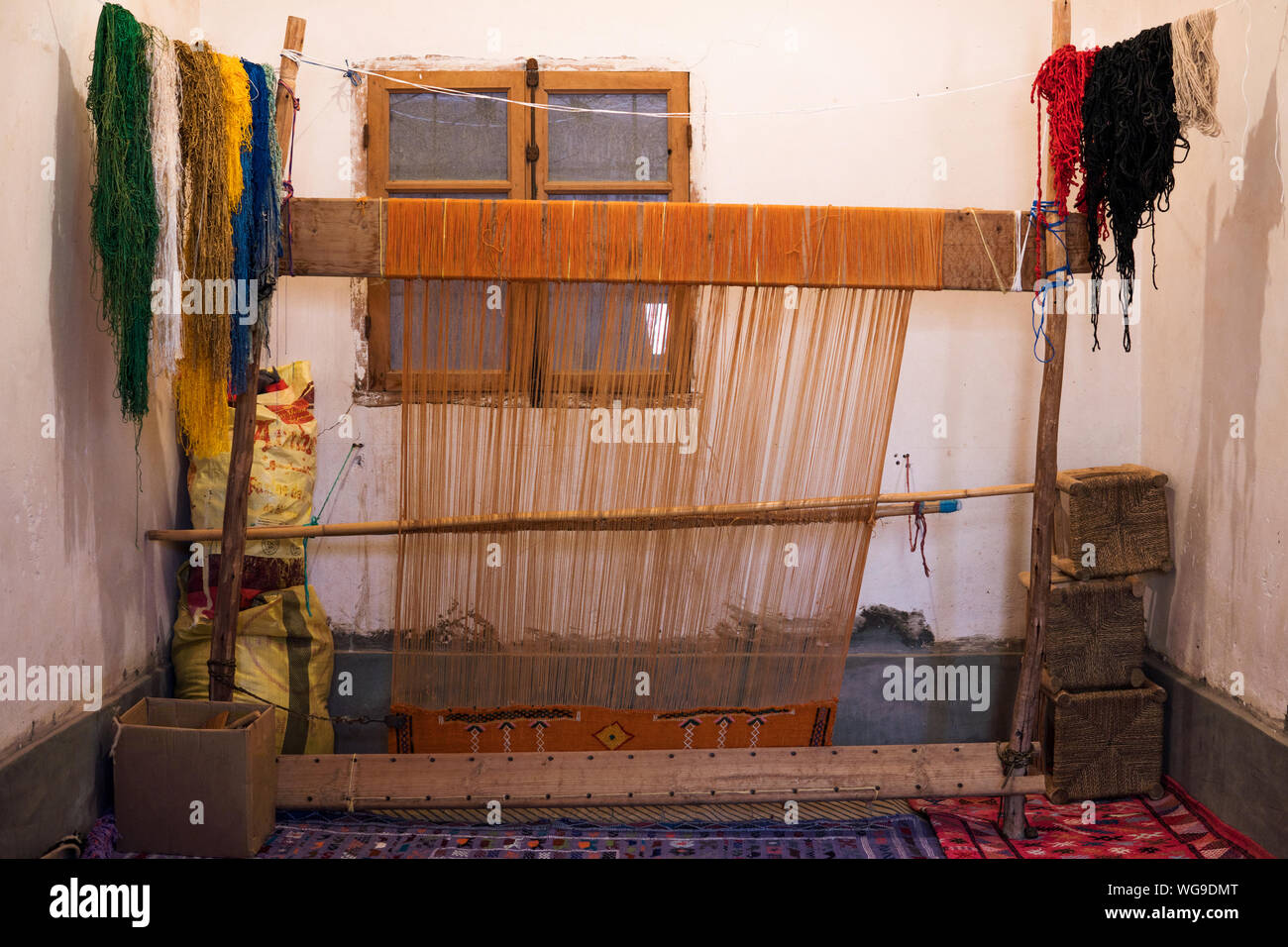 Old style tool for weaving a carpet with traditional techniques on a ...
