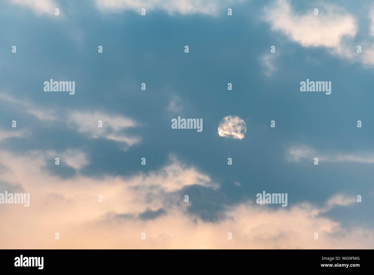 Moon behind clouds, Kyoto, Japan Stock Photo - Alamy