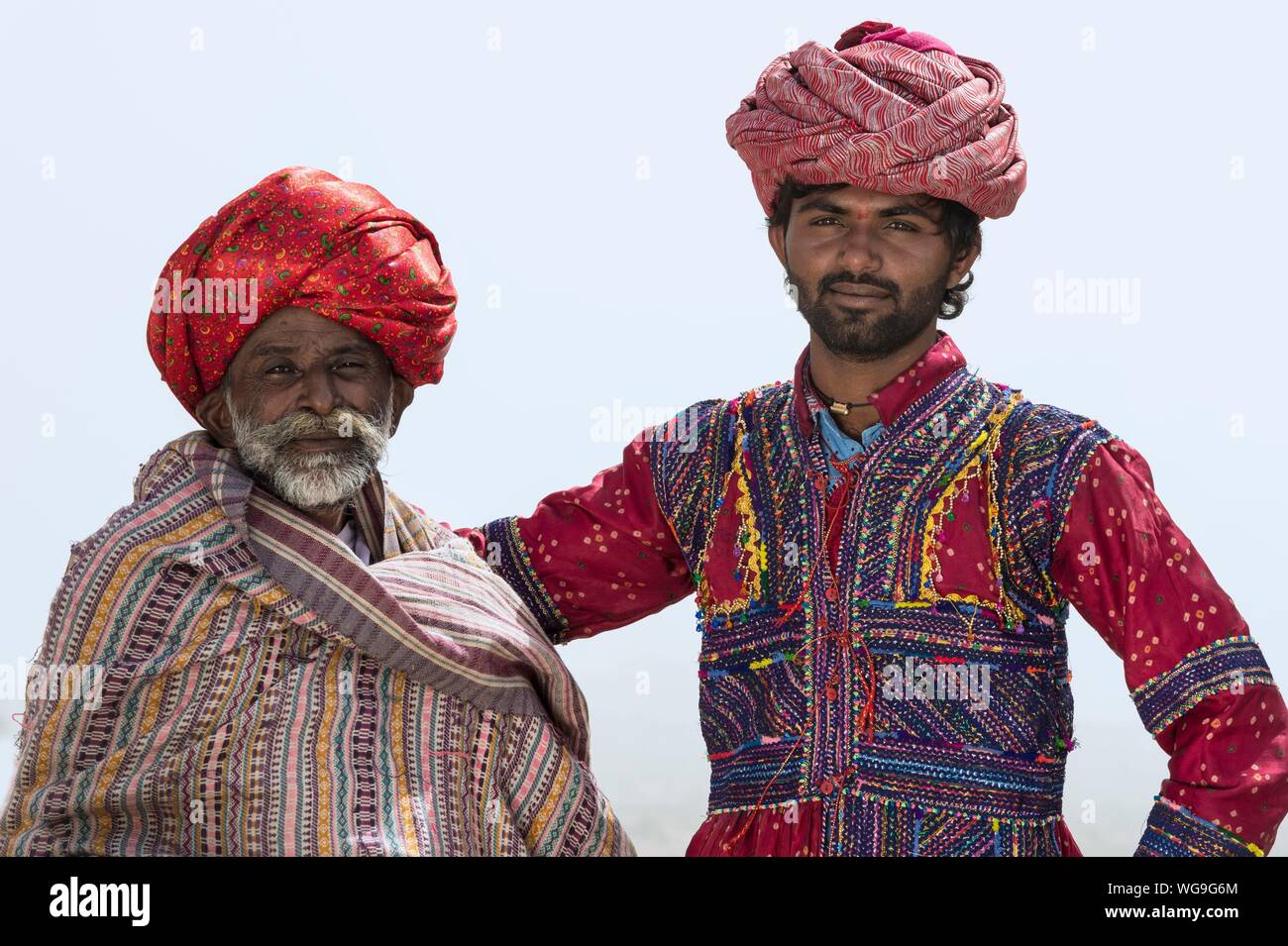 Two Rabari Men in traditional colorful clothes, portrait, Great Rann of ...