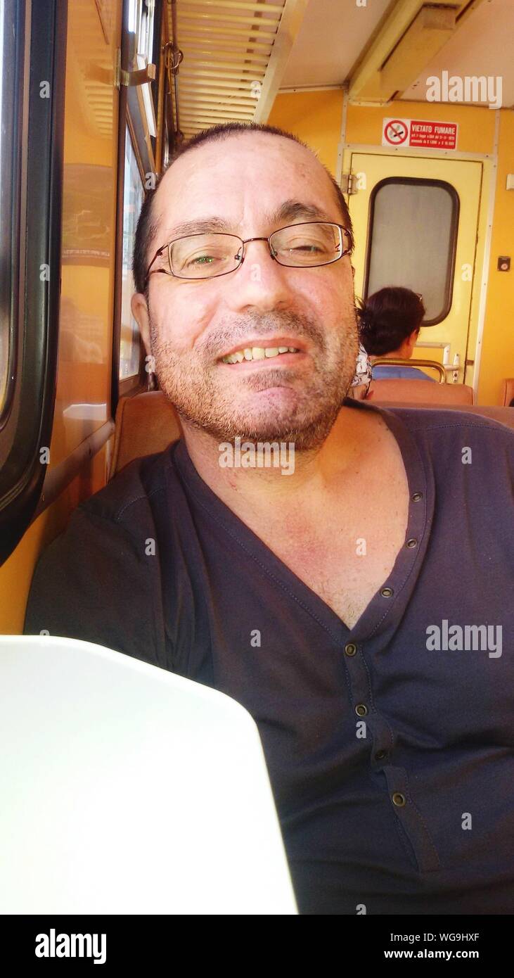 Man sitting train hi-res stock photography and images - Alamy