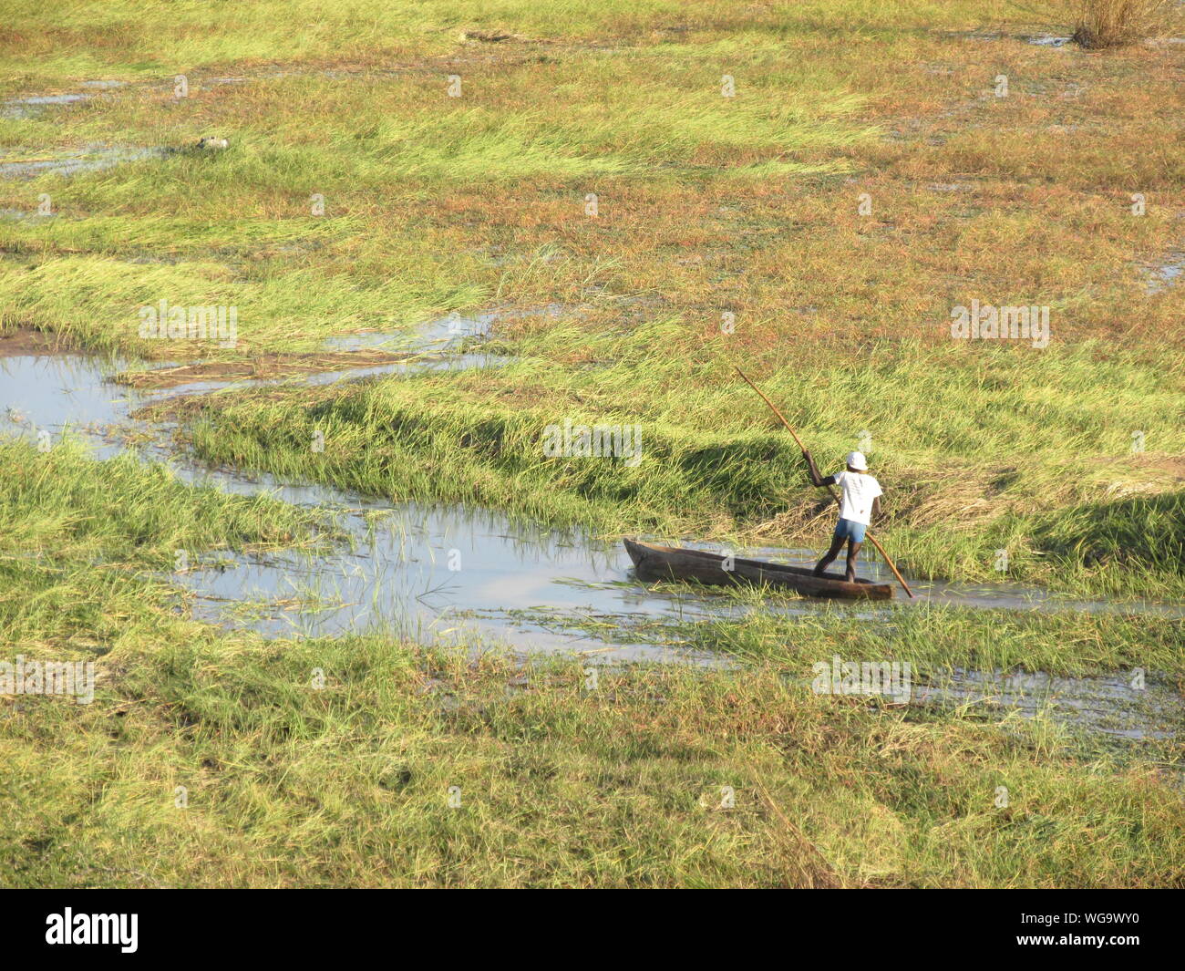 Man riding boat hi-res stock photography and images - Alamy