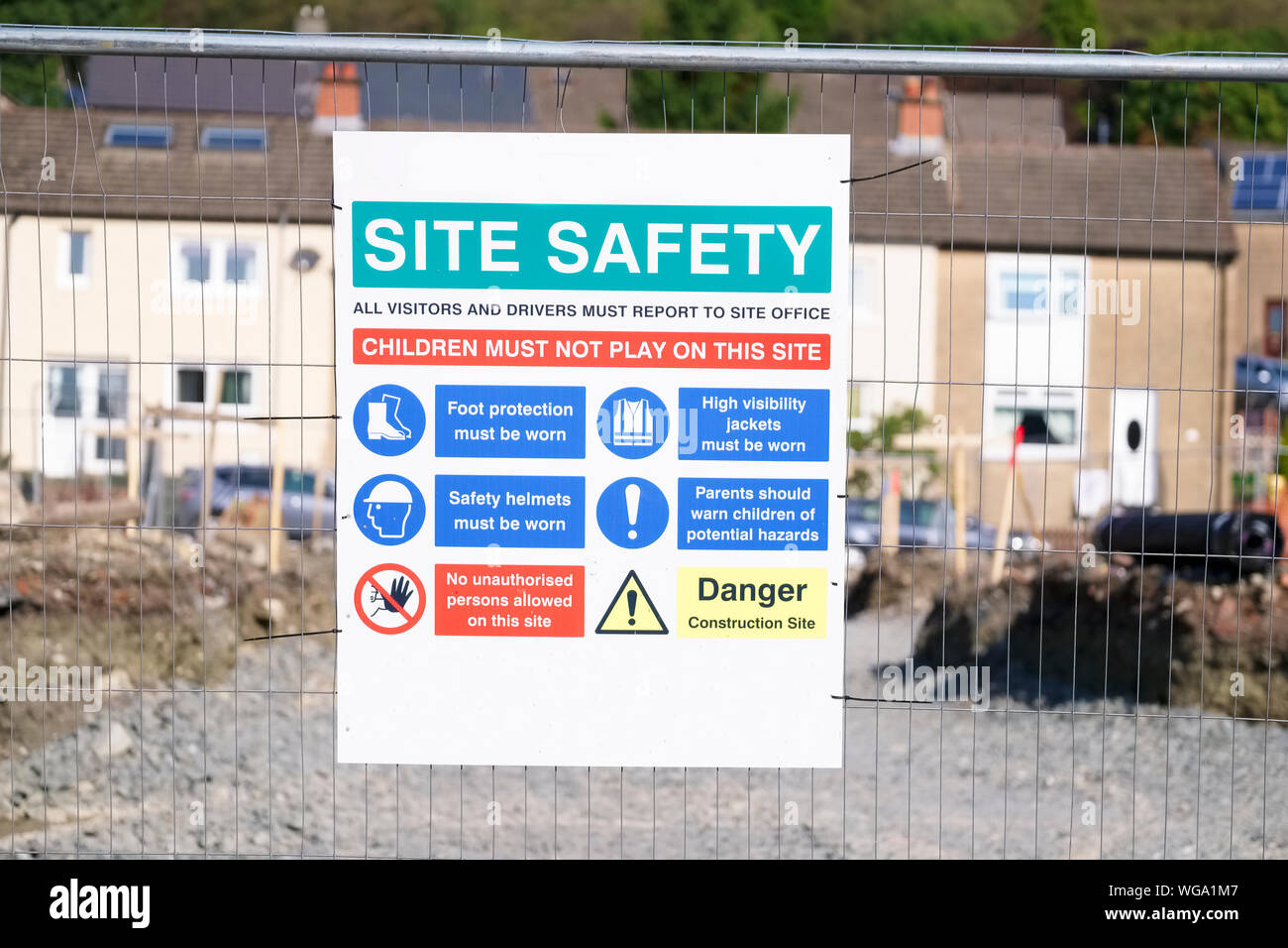 Site safety sign on construction building area fence Stock Photo - Alamy