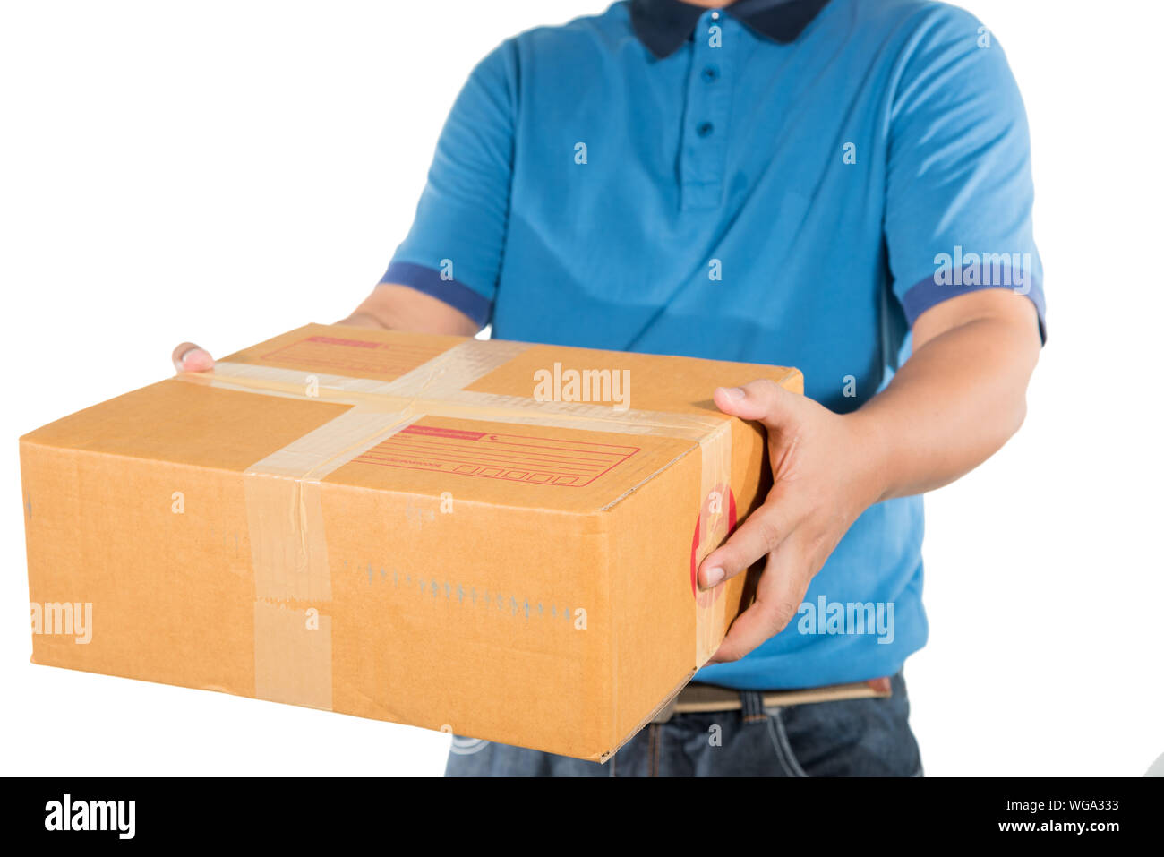 Midsection Of Delivery Man Holding Box While Standing Against White ...