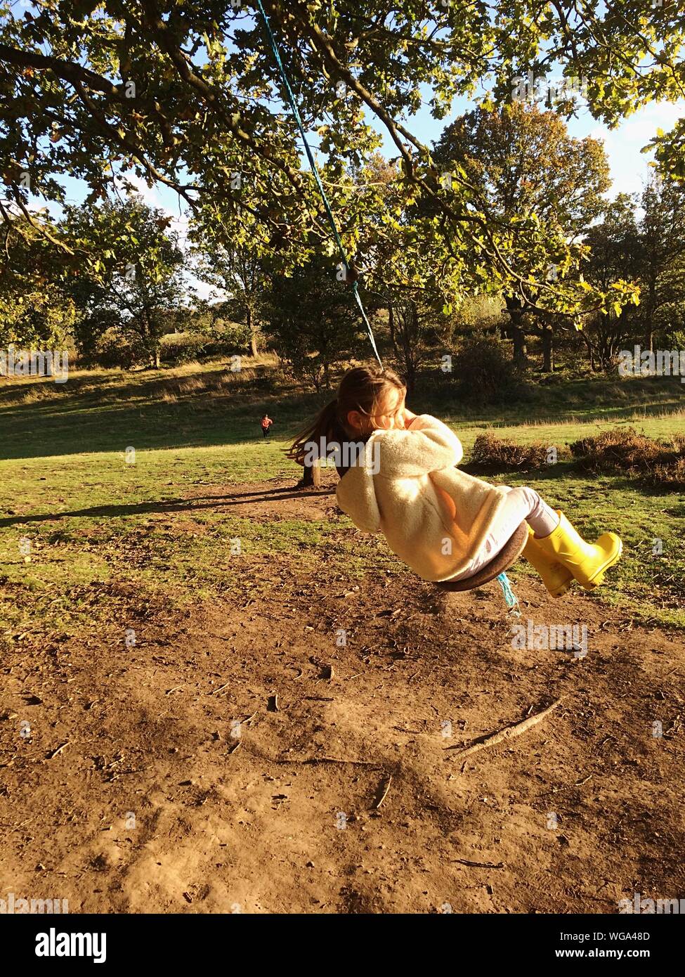 Girl swing rope hi-res stock photography and images - Alamy