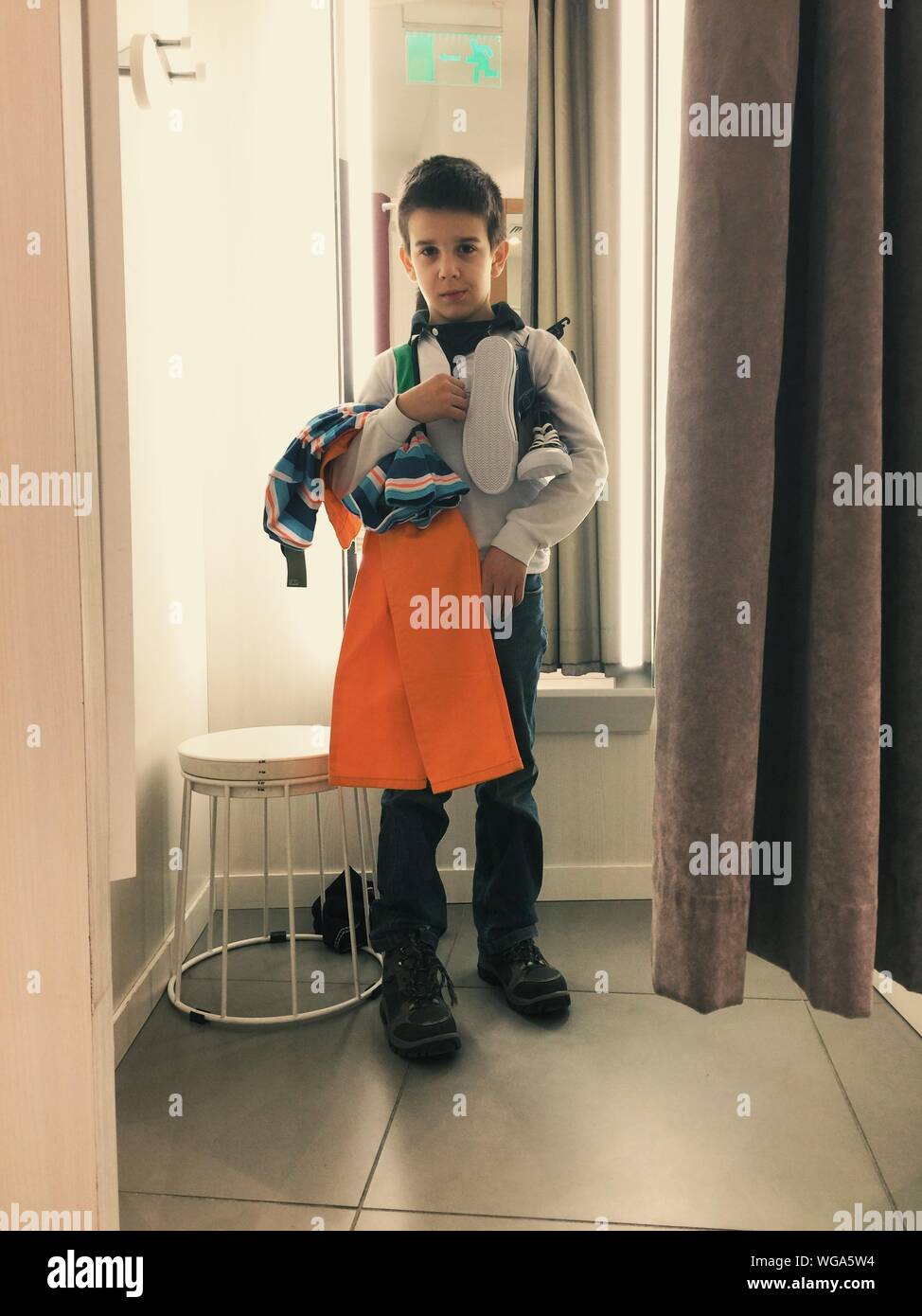 Primary age standing hi-res stock photography and images - Alamy