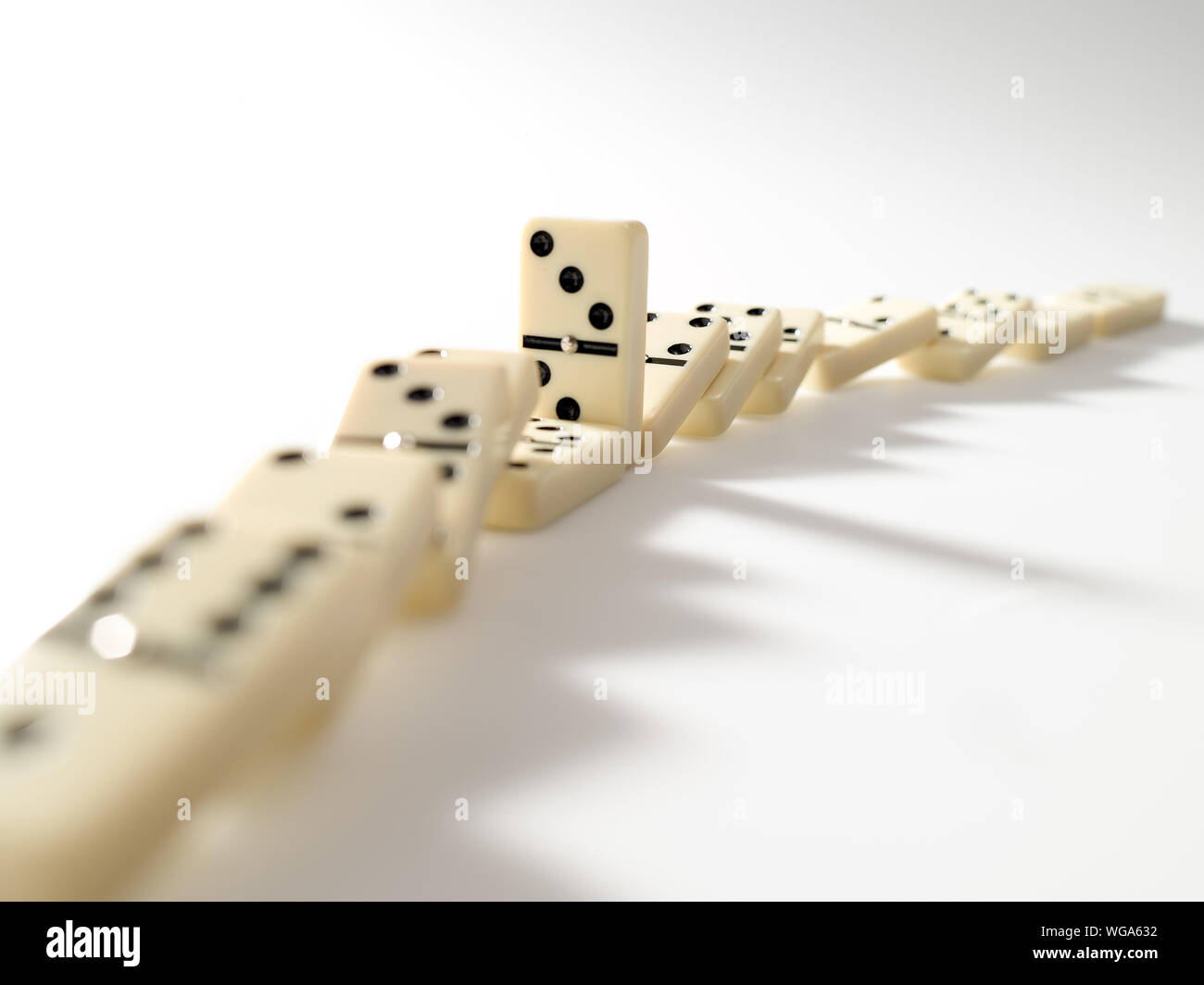 Dominoes falling large hi-res stock photography and images - Alamy