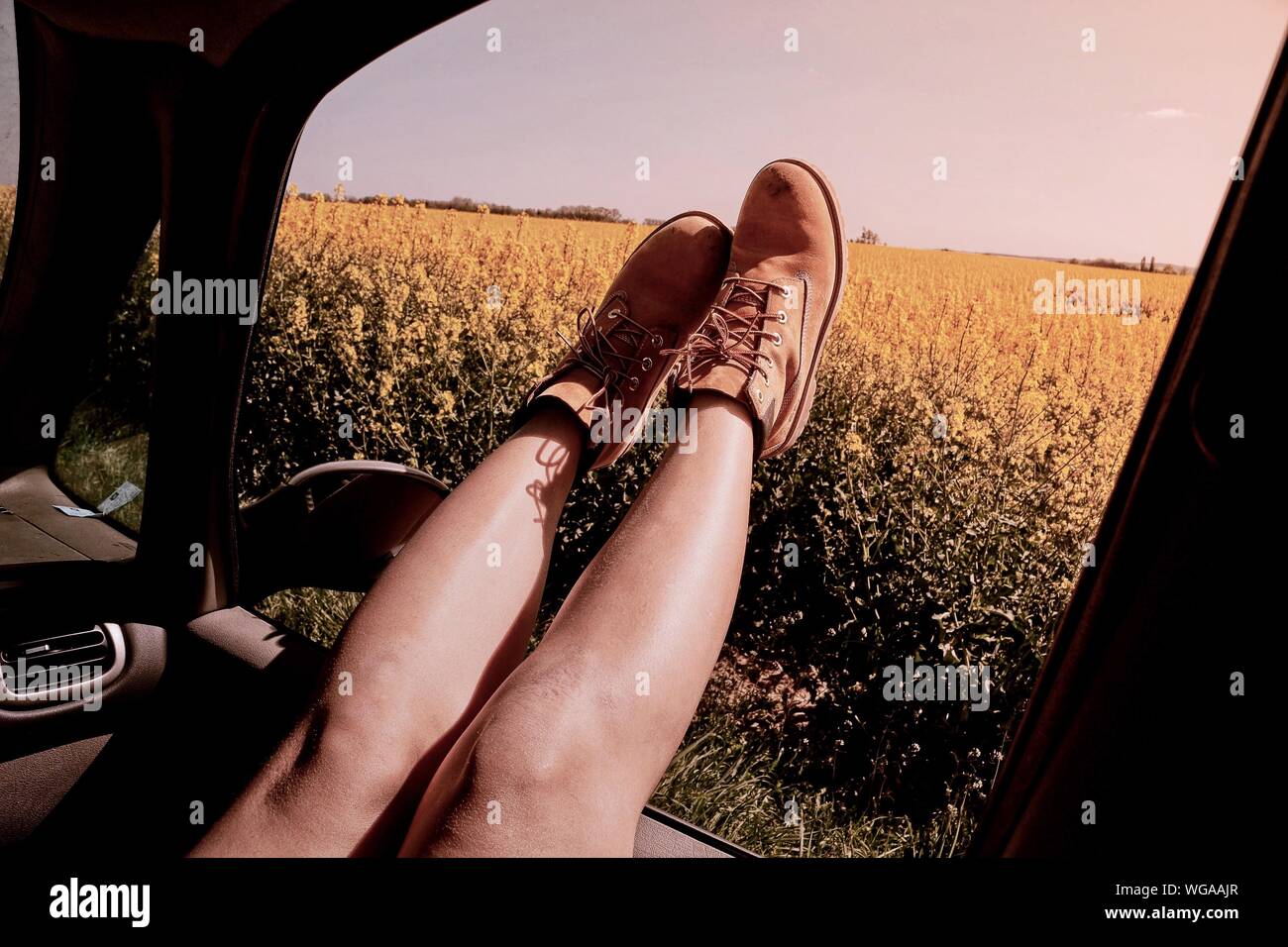 Feet car window hi-res stock photography and images - Alamy