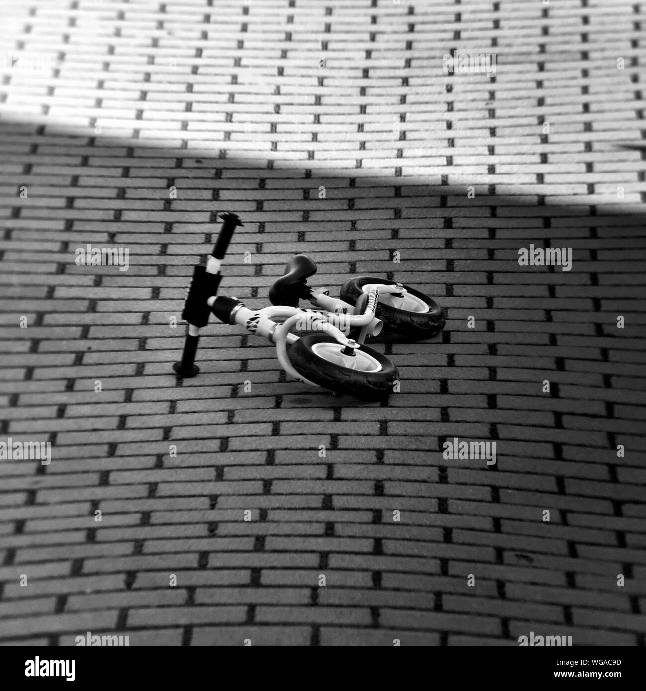 Lying down on paving hi-res stock photography and images - Alamy