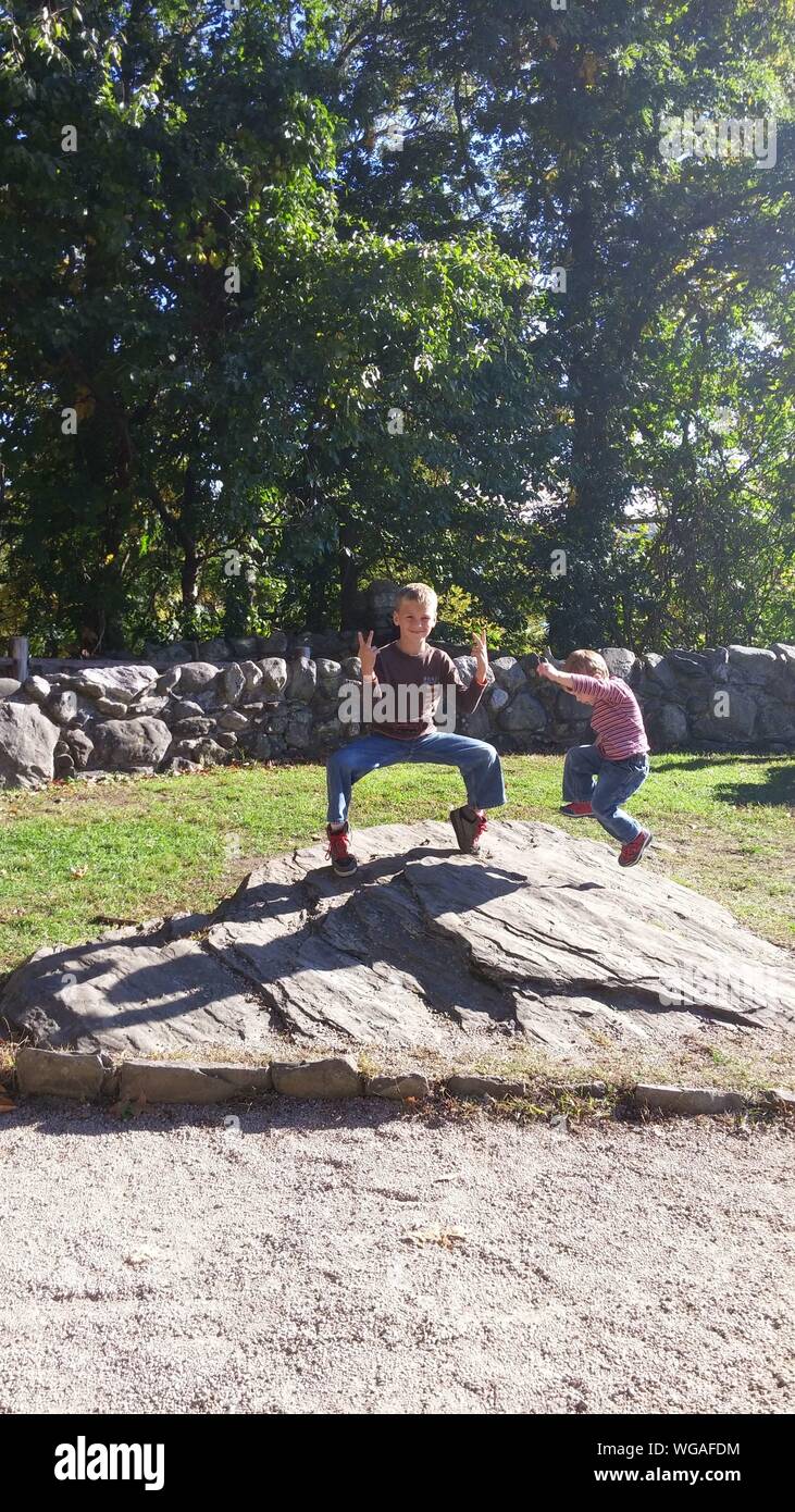 Jumping over rocks hi-res stock photography and images - Alamy