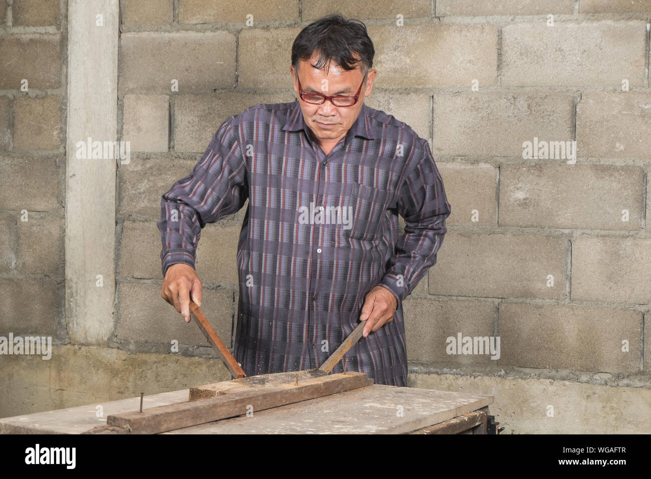 Working as carpenter hi-res stock photography and images - Alamy