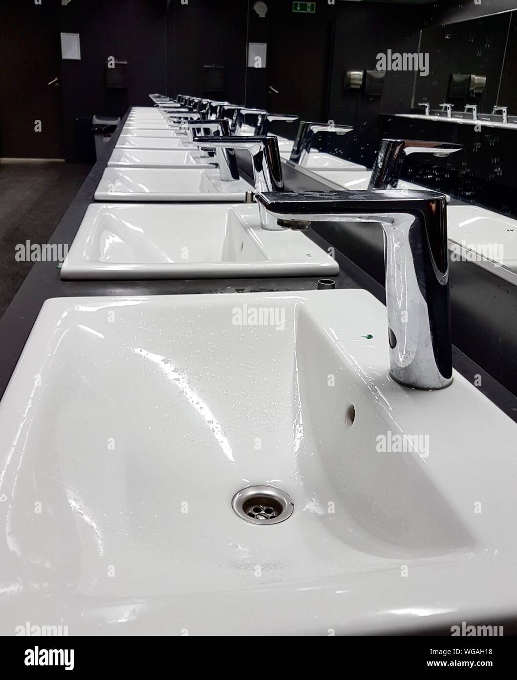 Public bathroom sink hi-res stock photography and images - Alamy