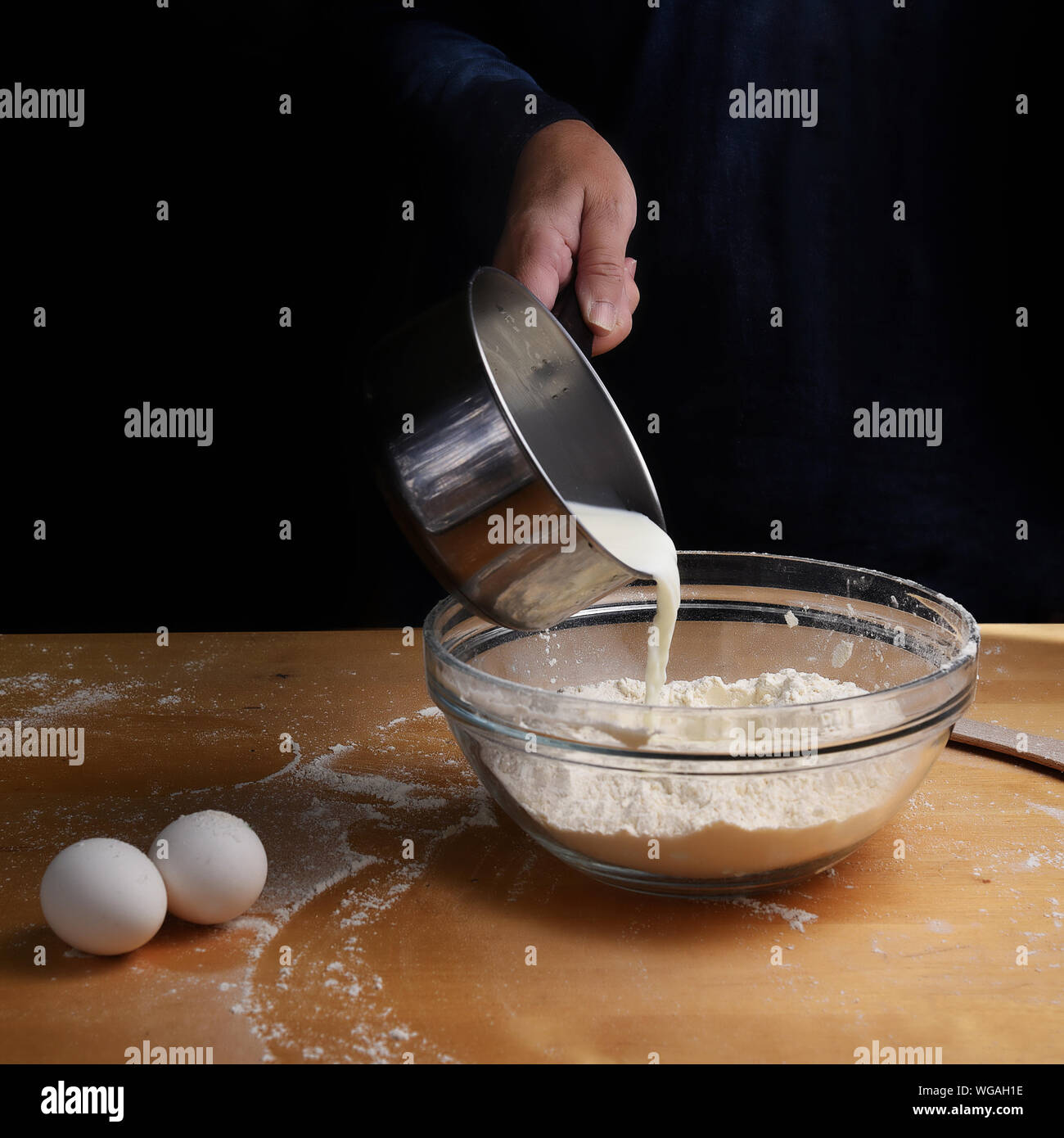 Milk pouring flour hi-res stock photography and images - Alamy