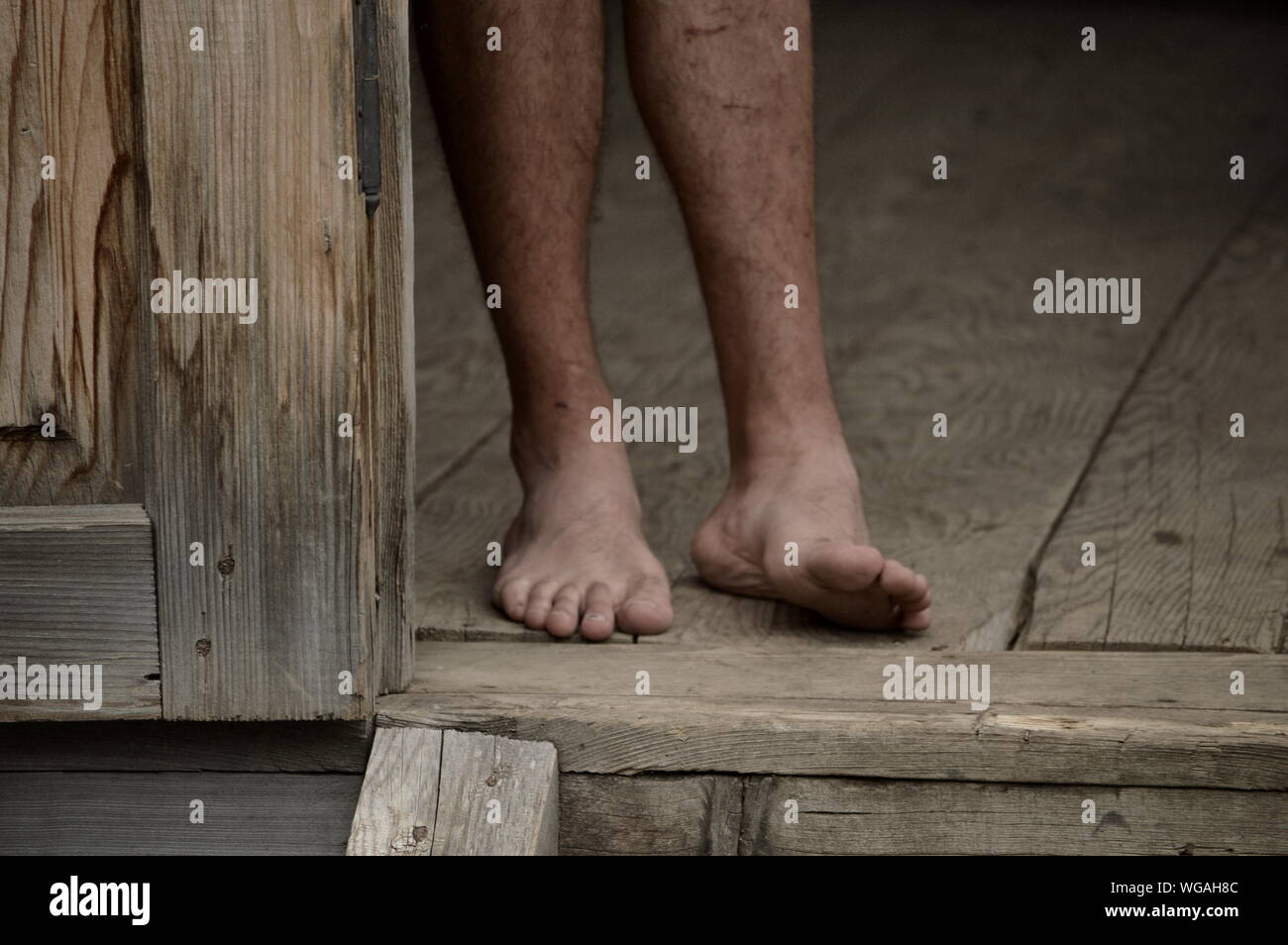 Barefoot man hi-res stock photography and images - Alamy
