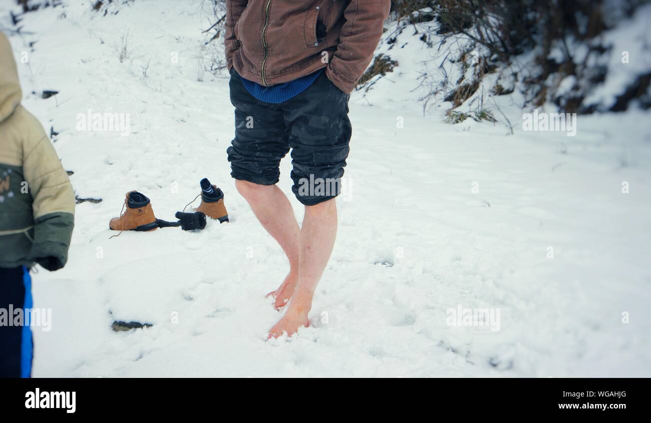 Barefoot snow hi-res stock photography and images - Alamy