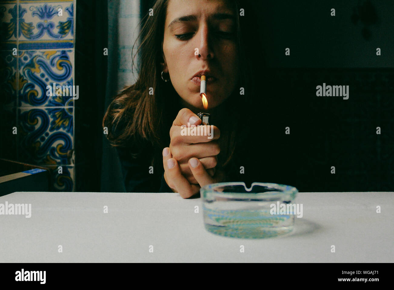 Young Woman Lighting Cigarette High Resolution Stock Photography and ...