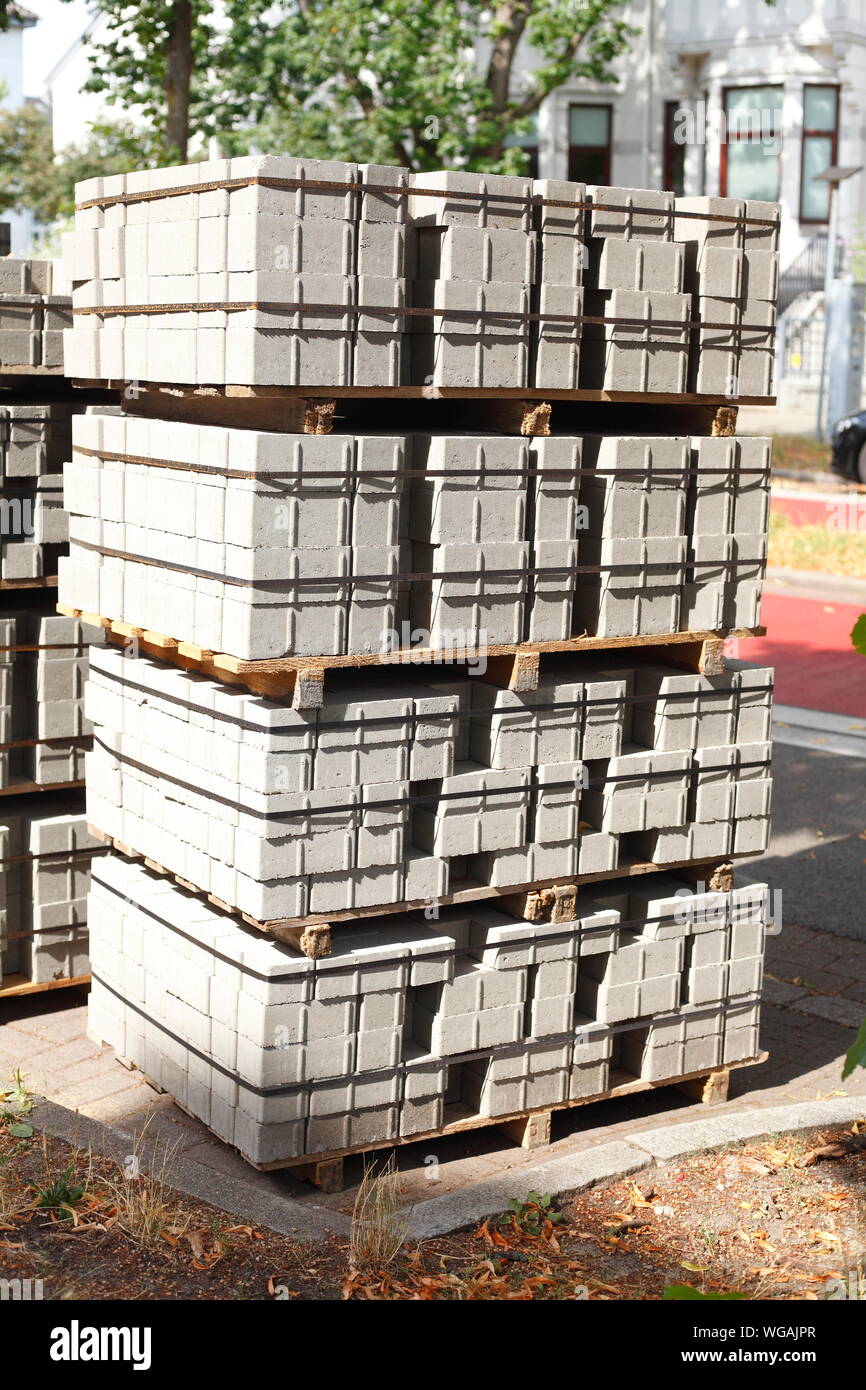 Concrete paving stones made of concrete, stacked on pallets Stock Photo ...