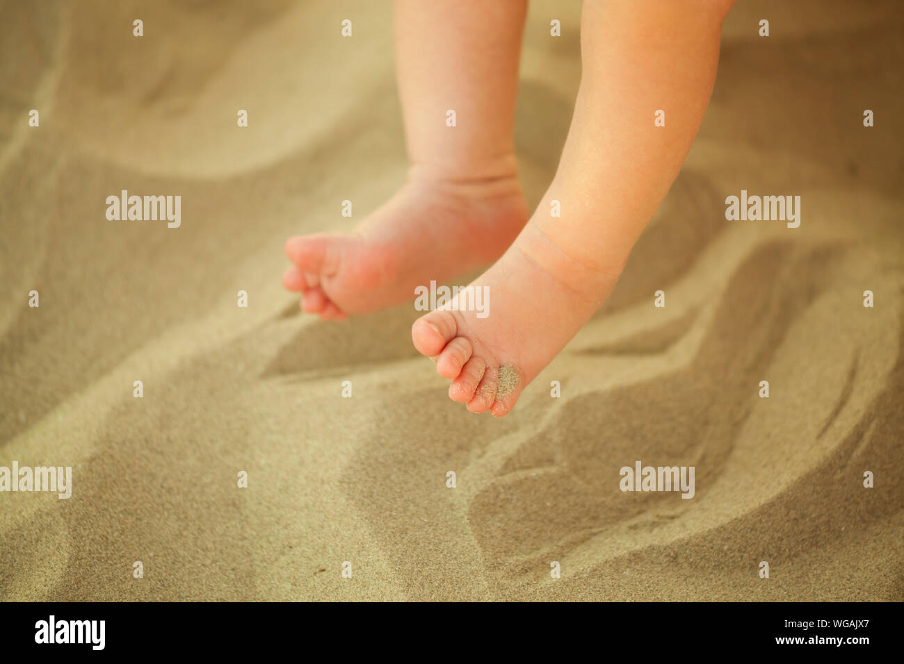 Child feet sand hi-res stock photography and images - Alamy