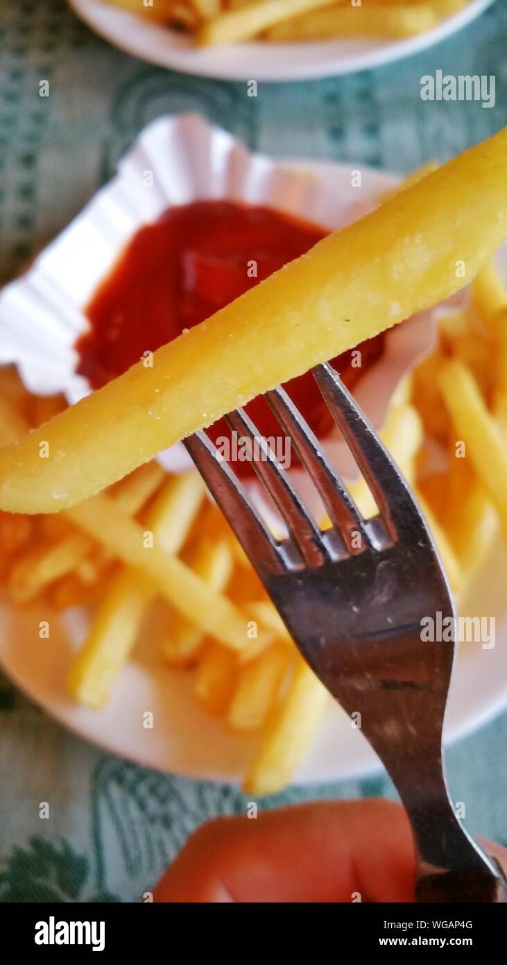 Fries fork hi-res stock photography and images - Alamy