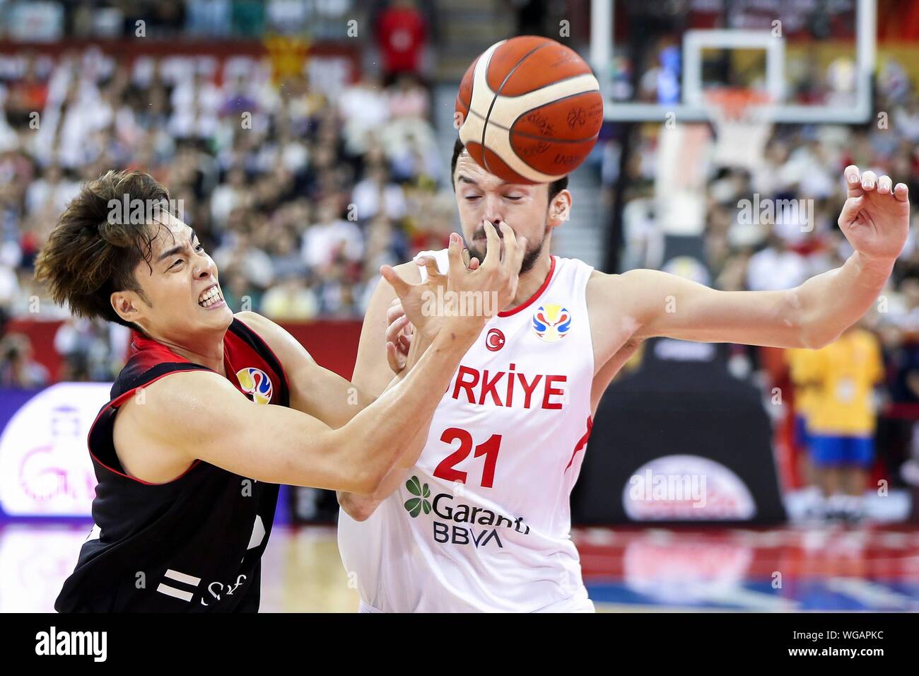 Shanghai, China. 1st Sep, 2019. Joji Takeuchi (L) of Japan competes ...