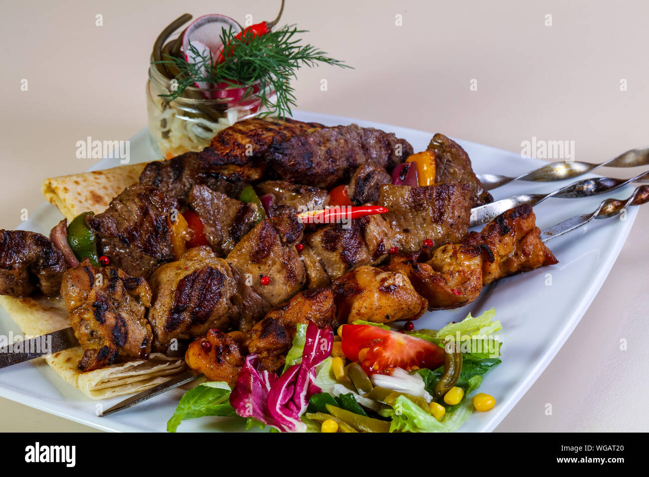 Barbeque meat mix plate with vegetalbes Stock Photo - Alamy