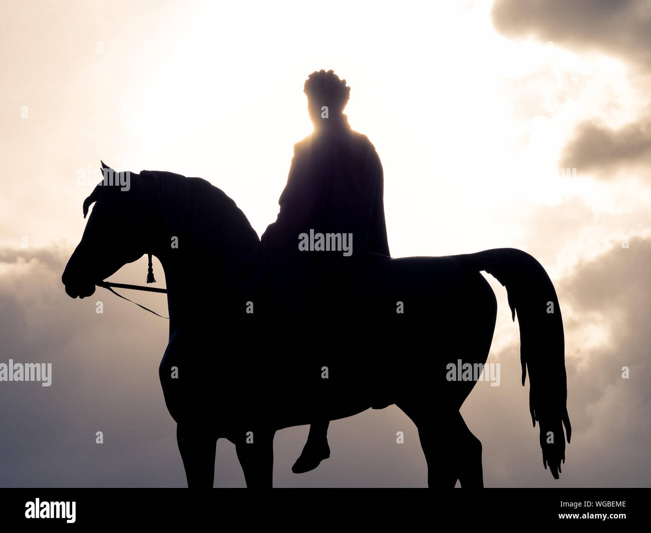 Silhouette man horse against sunset hi-res stock photography and images ...