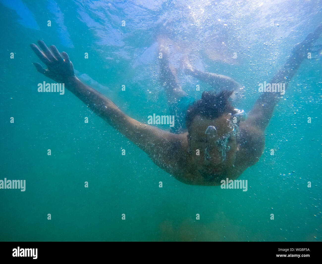 Man swimming underwater sea hi-res stock photography and images - Alamy