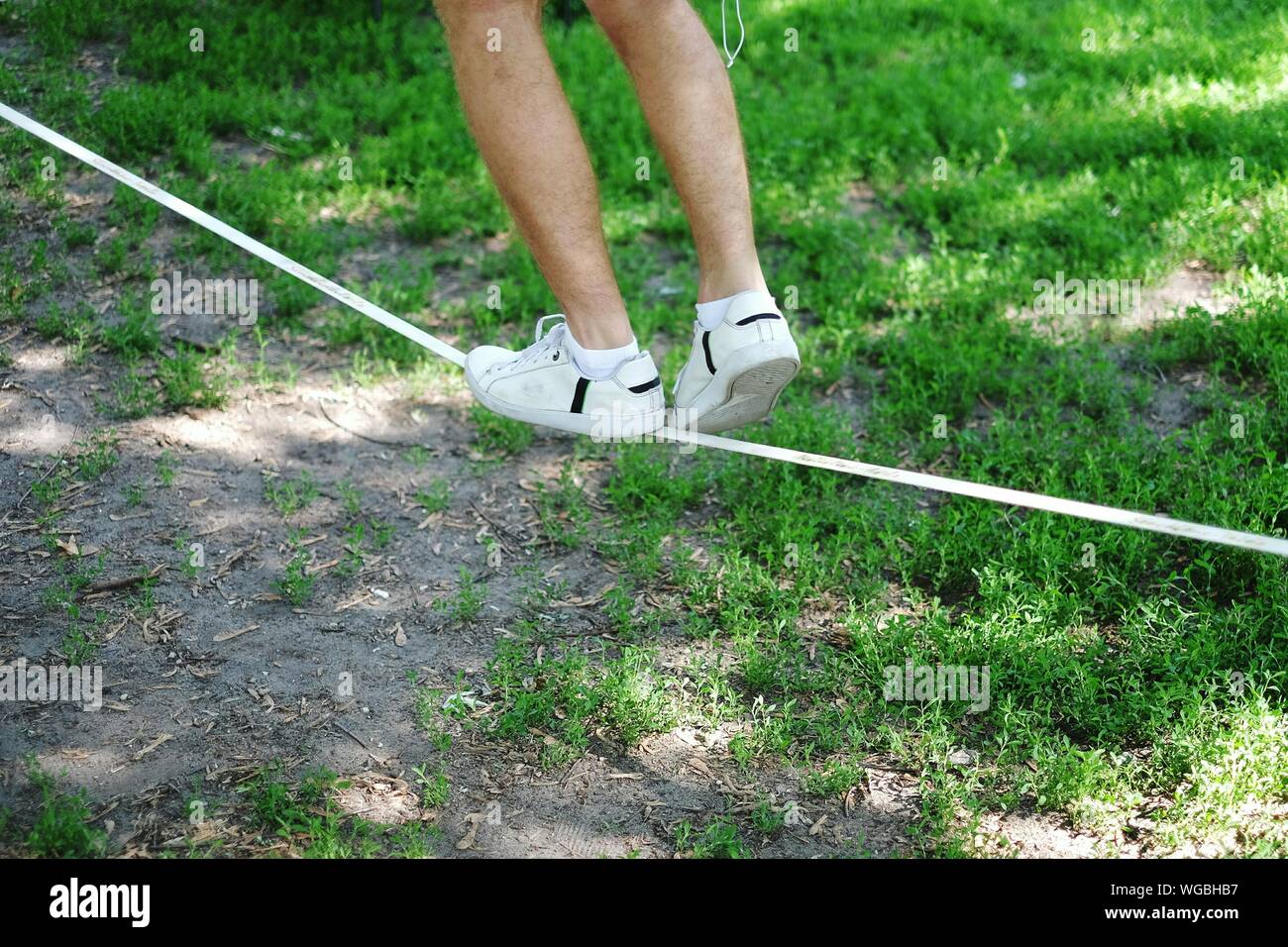 Walking the tightrope hi-res stock photography and images - Alamy