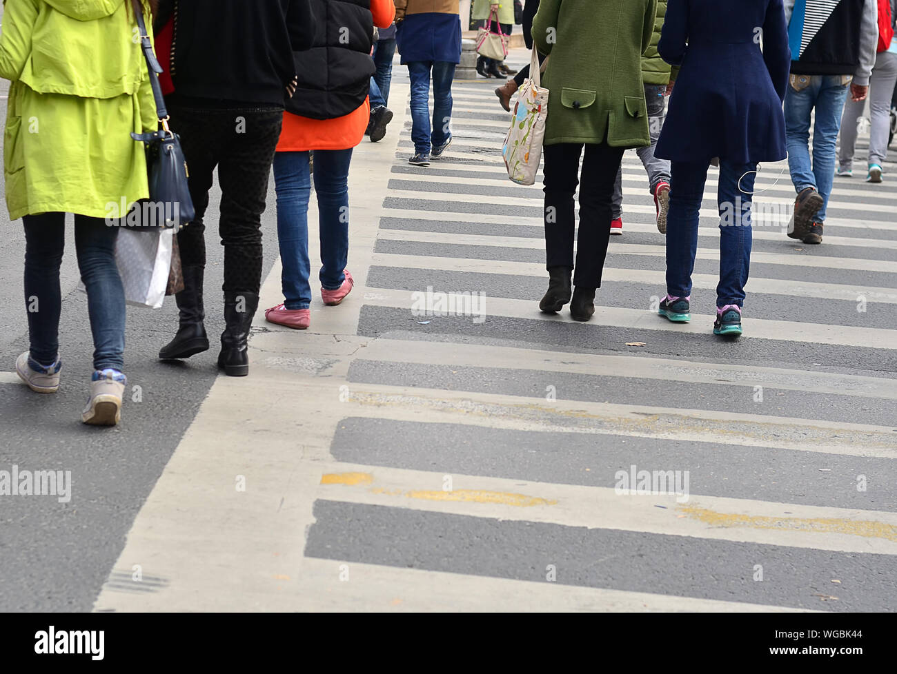 Walking on crosswalk hi-res stock photography and images - Alamy