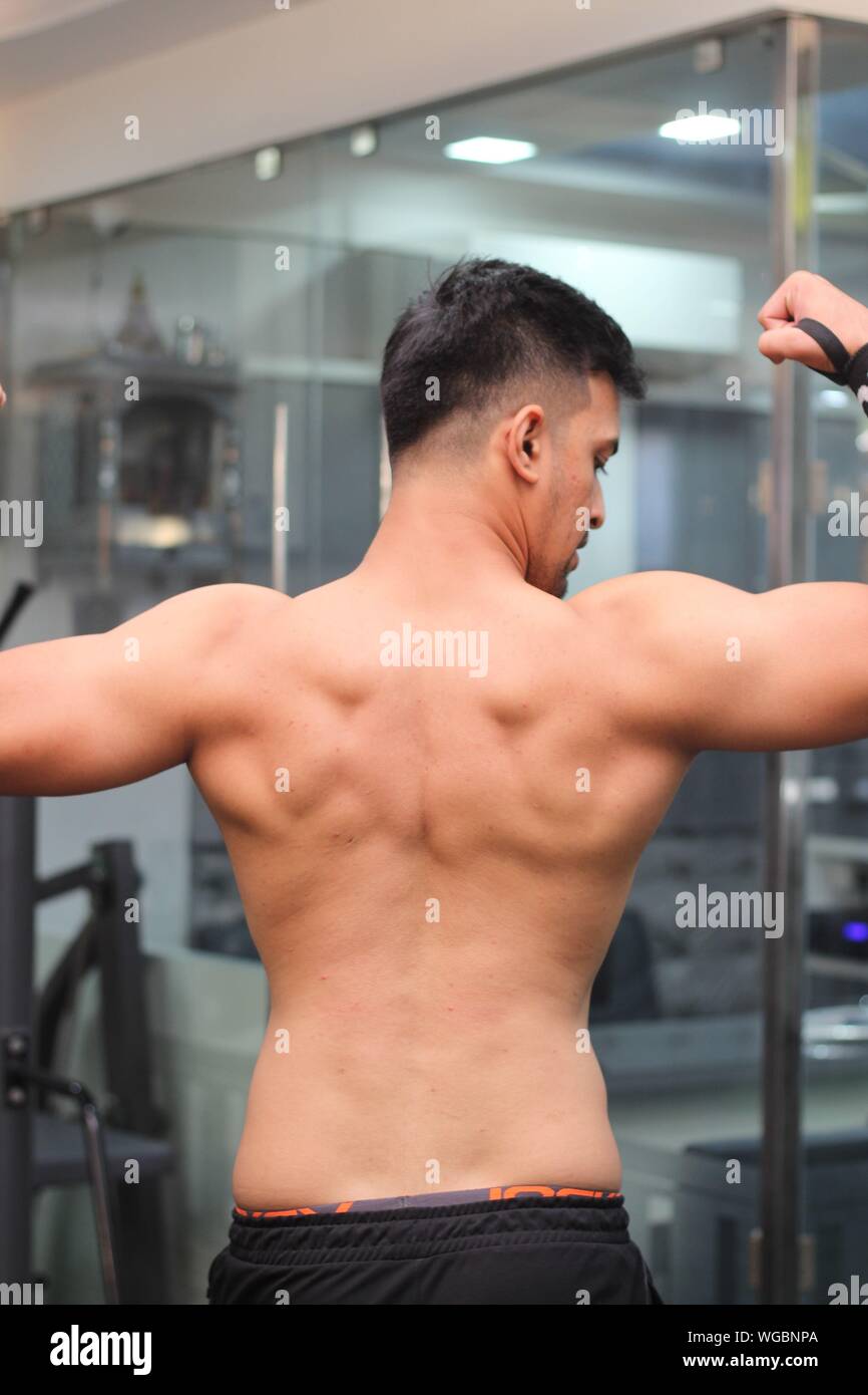 People Flexing Muscles In Gym High Resolution Stock Photography and ...