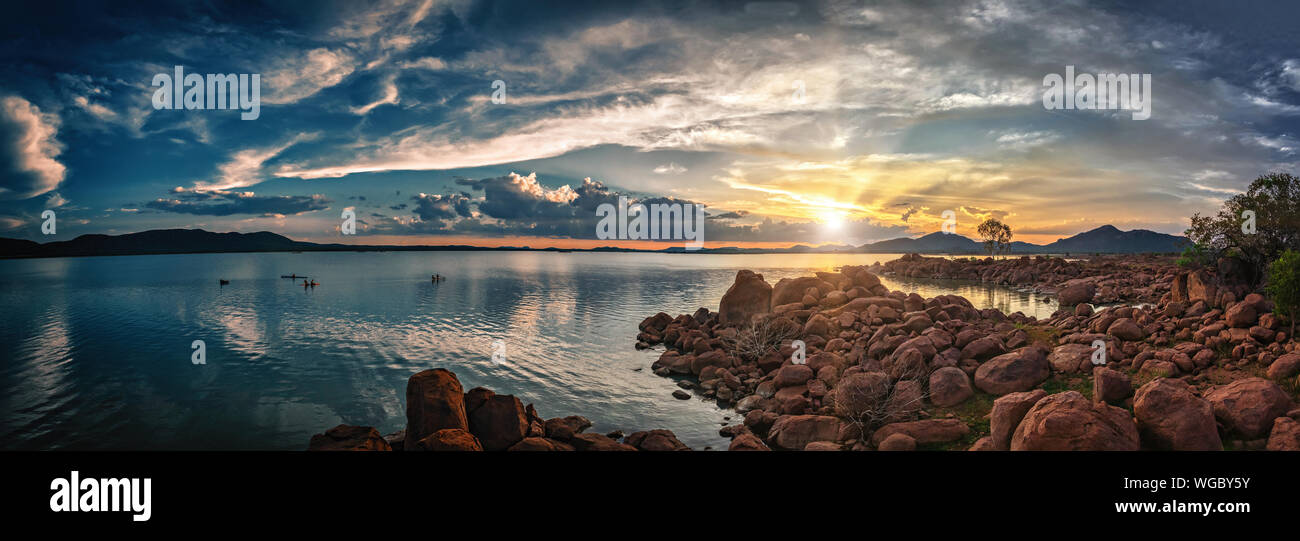 Sunset at Gaborone dam, in Botswana after a short rainfall Stock Photo ...