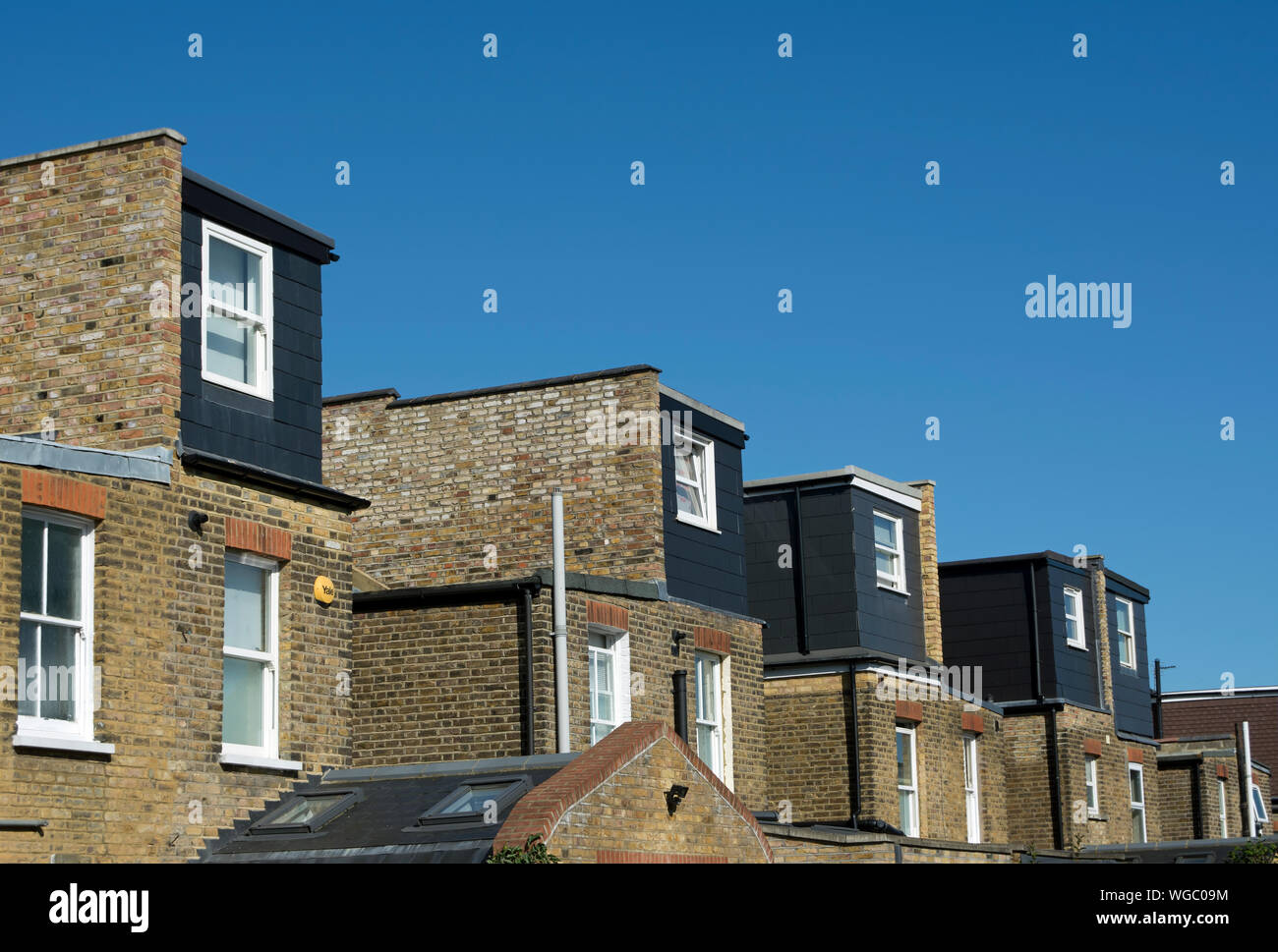 row of converted lofts of 19th century houses in twickenham, middlesex ...