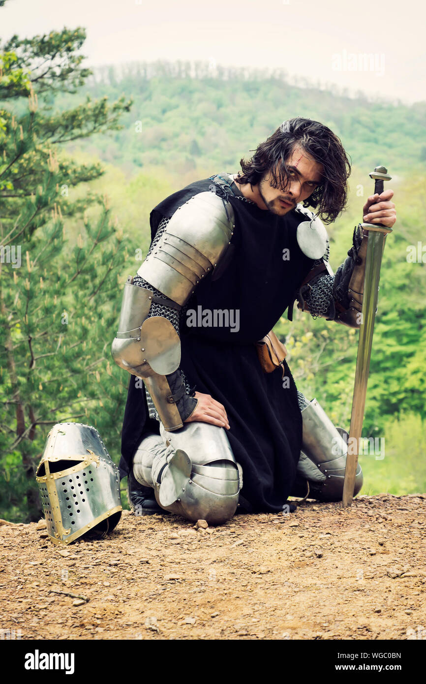 Knight Kneeling High Resolution Stock Photography and Images - Alamy