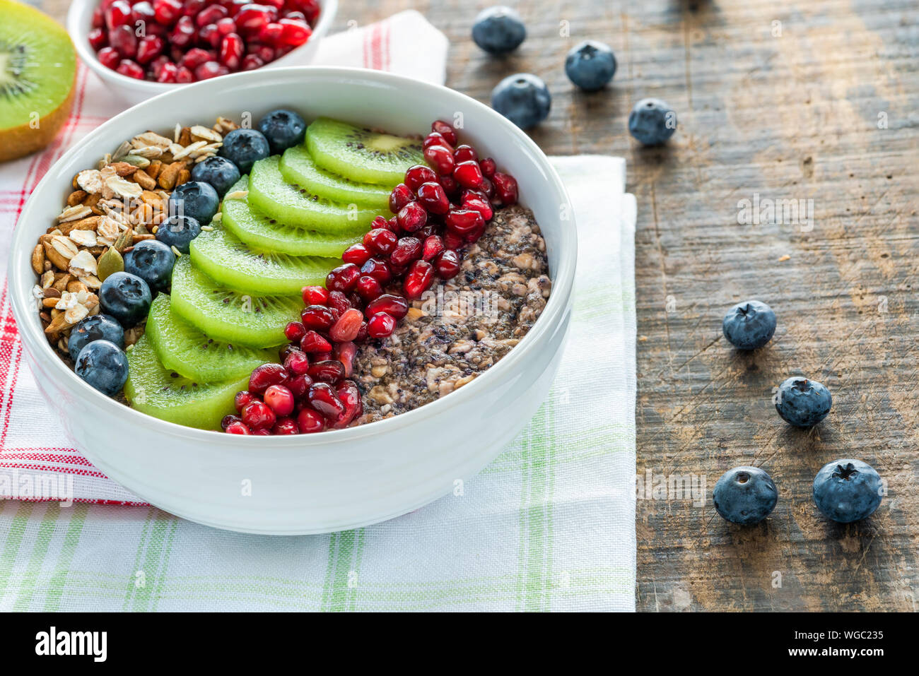 Summer porridge with mixed seeds and fresh fruit - blueberries ...