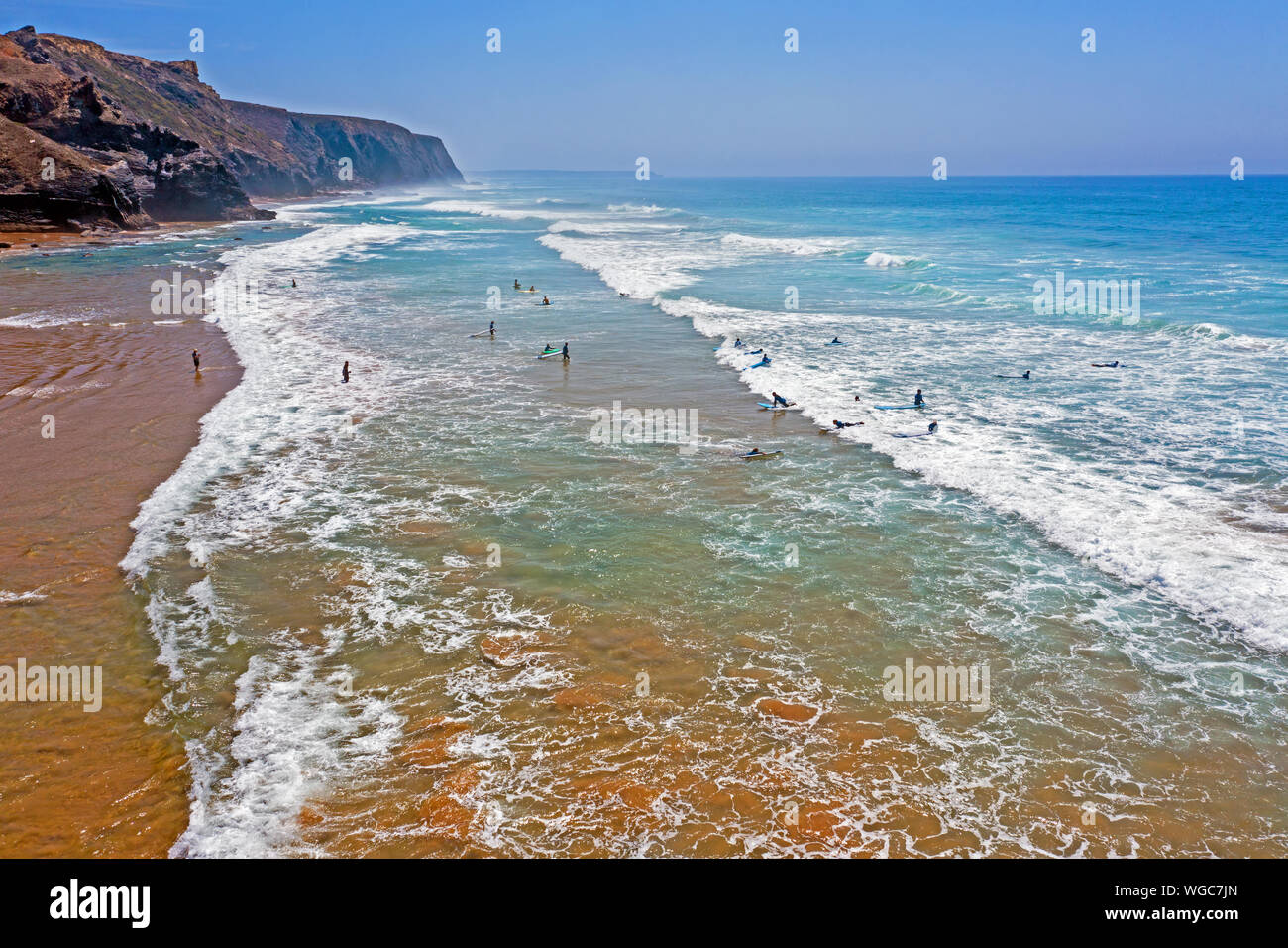 Aerial from surfers getting surfing lessons at the atlantic ocean Stock ...