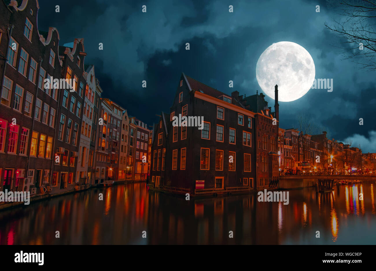 City scenic in Amsterdam the Netherlands at night by full moon Stock ...