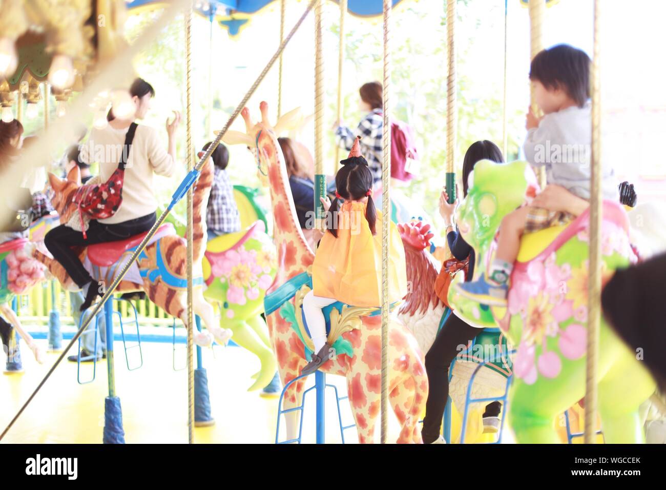 Children carousel park hi-res stock photography and images - Alamy